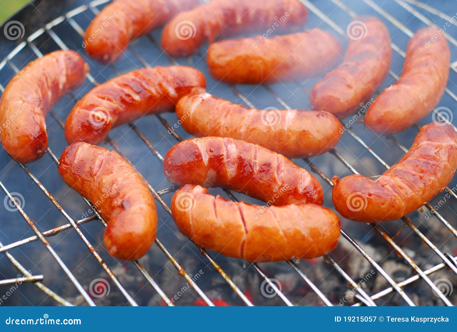 Sausages on the grill stock image. Image of delicious - 19215057
