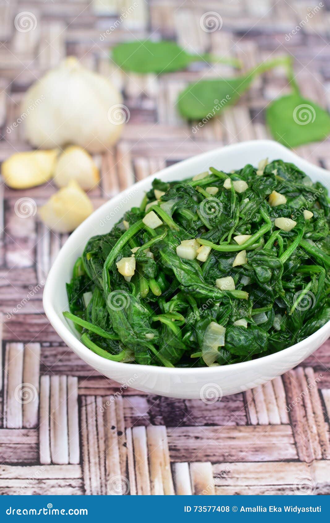 Saute garlic spinach stock photo. Image of dish, healthy - 73577408