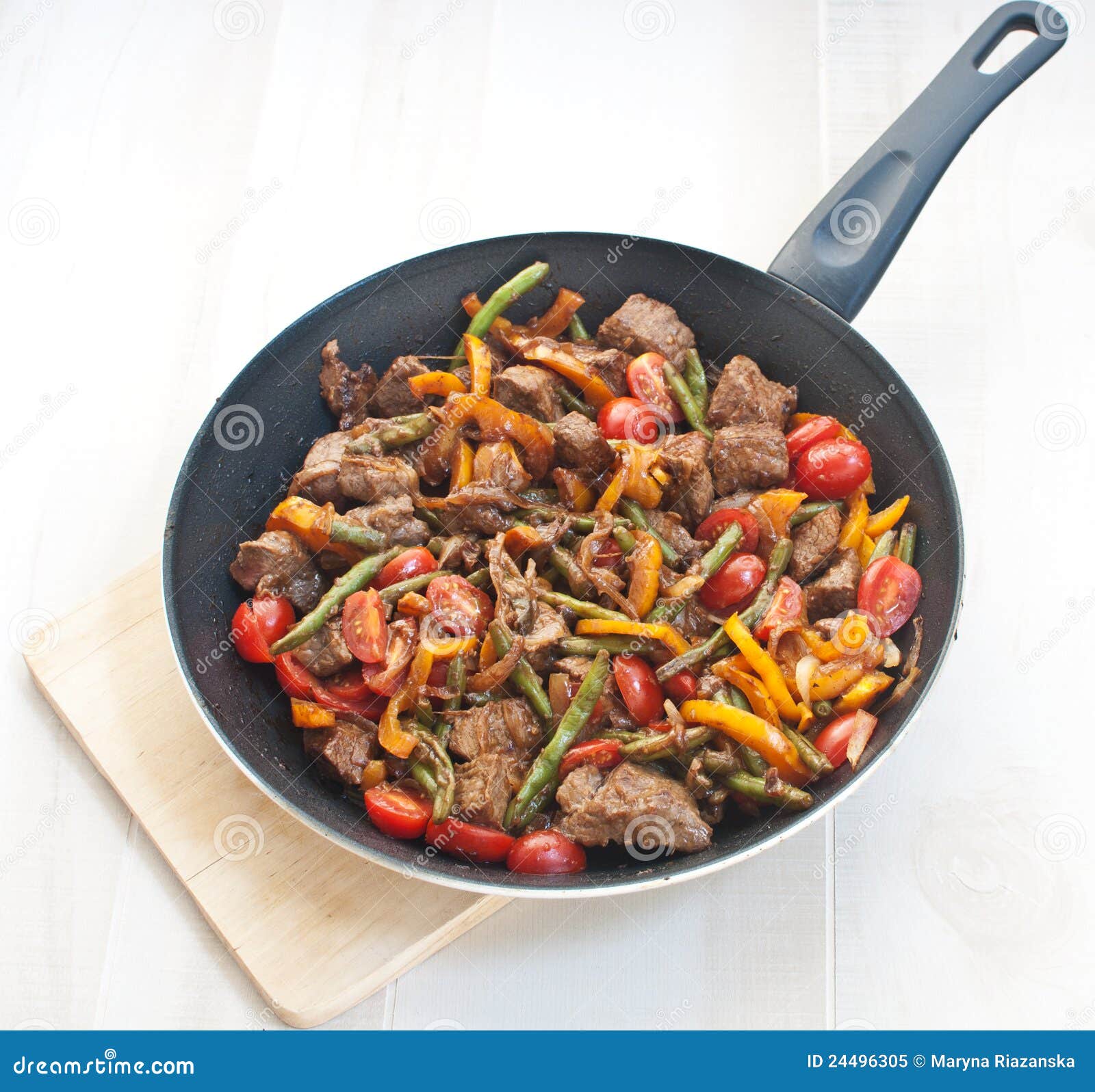 Sauted meat and vegetables stock image. Image of fried - 24496305