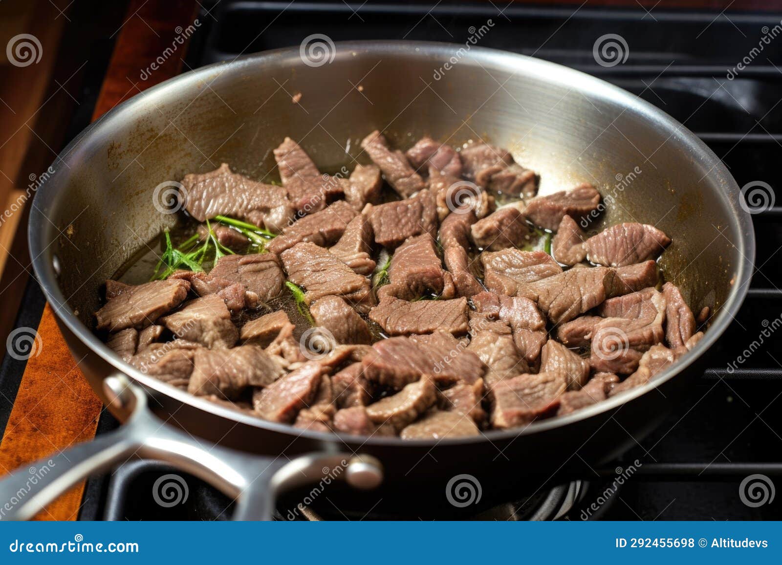 Sauteing Beef Strips in a Hot Stainless-steel Pan Stock Illustration ...