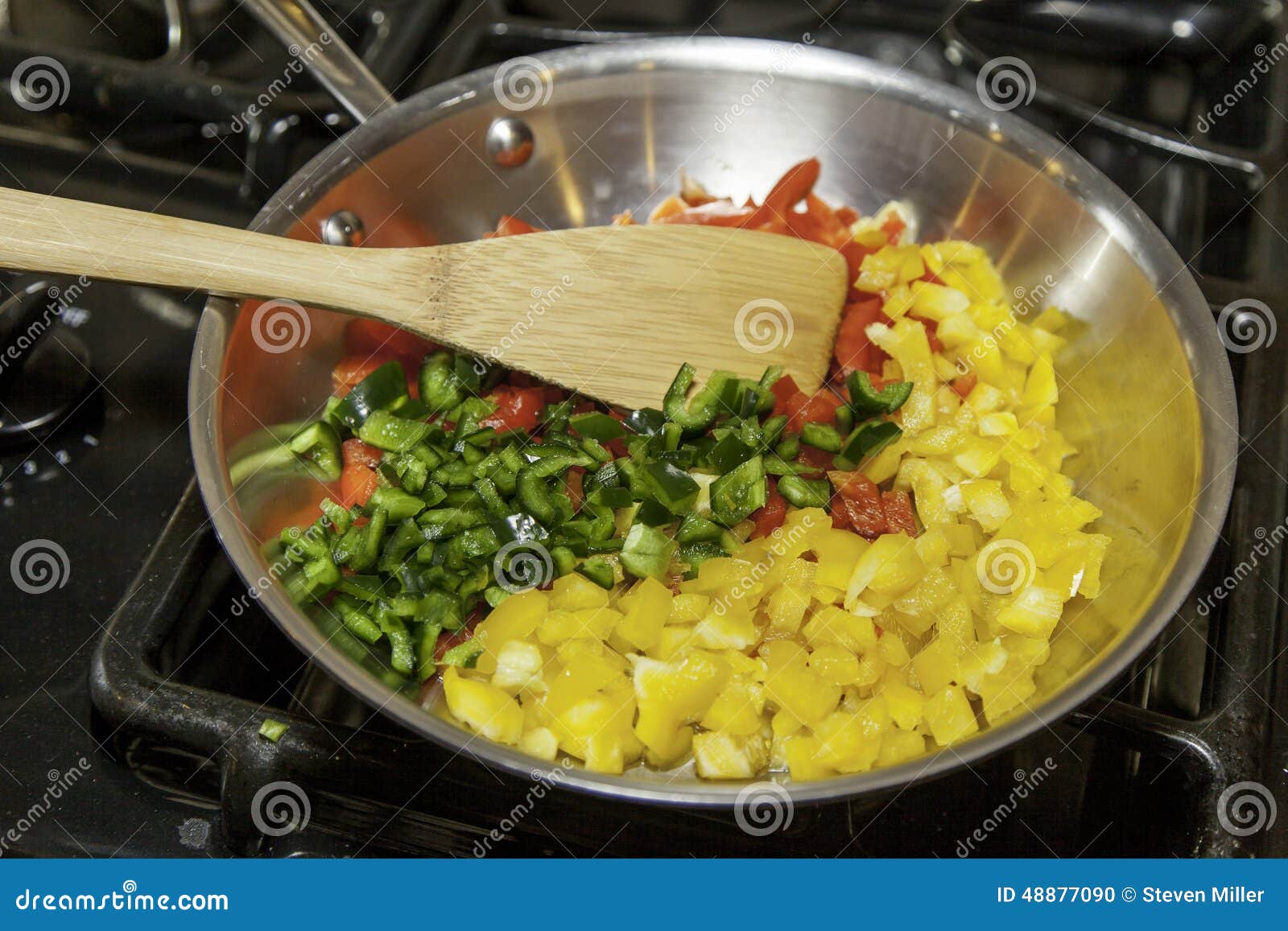 Sauteing Peppers stock photo. Image of saute, cooking - 48877090