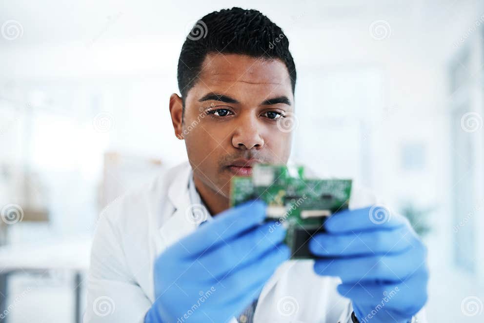 The Savant in it System Maintenance. a Young Man Repairing Computer ...