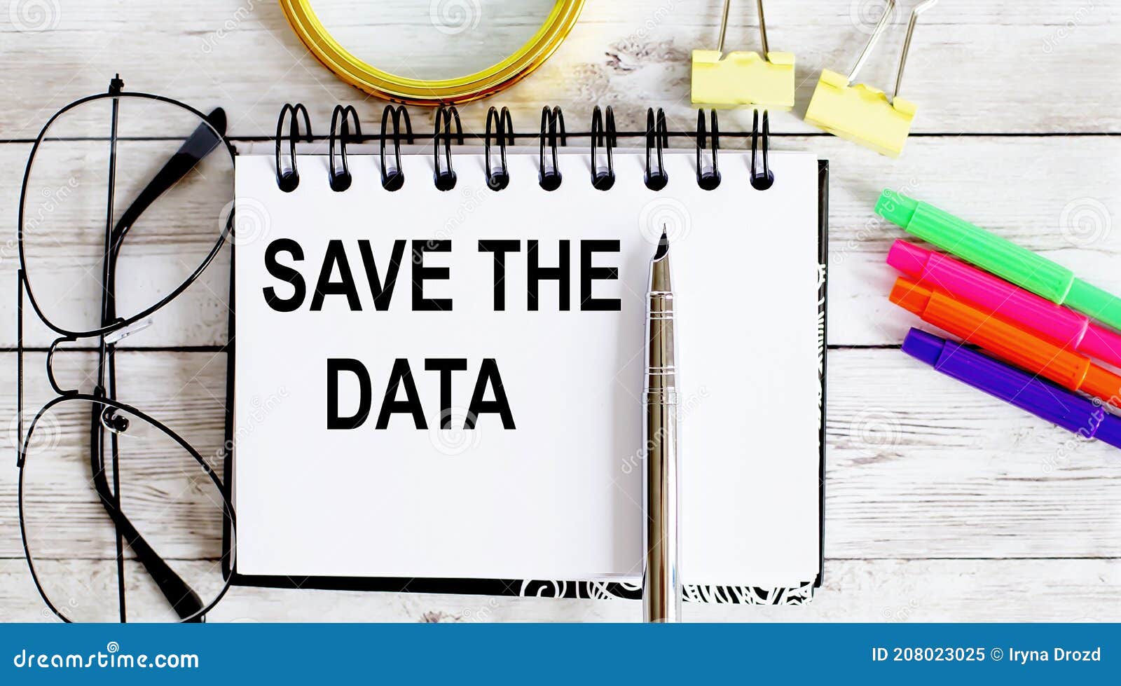 SAVE the DATA Written in a Notebook on White Background with Office ...