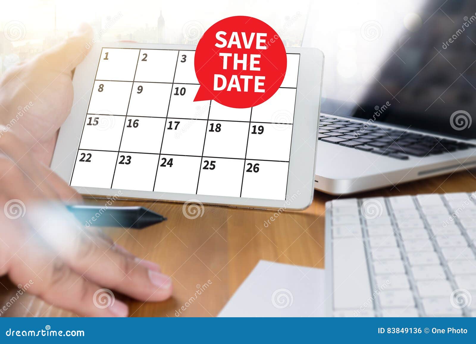 SAVE the DATE Message on Hand Holding To Touch a Phone, Top View Stock ...