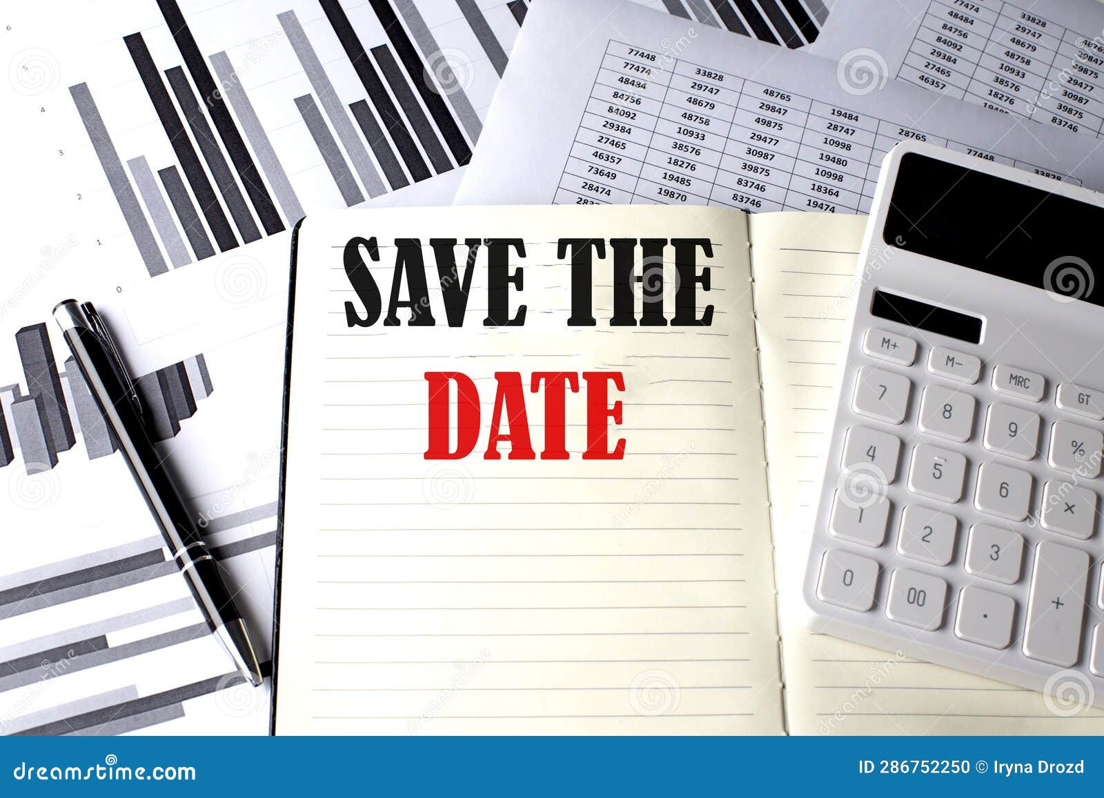 SAVE the DATE Text Written on a Notebook on Chart and Diagram Stock ...