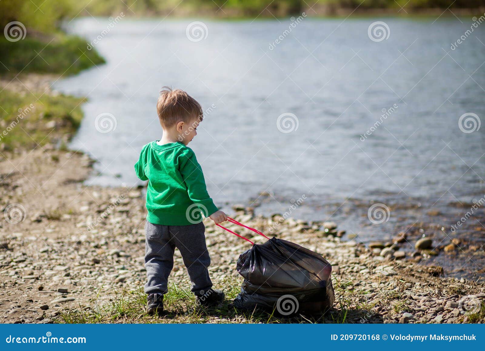 Save Environment Concept, a Little Boy Collecting Garbage and Plastic ...