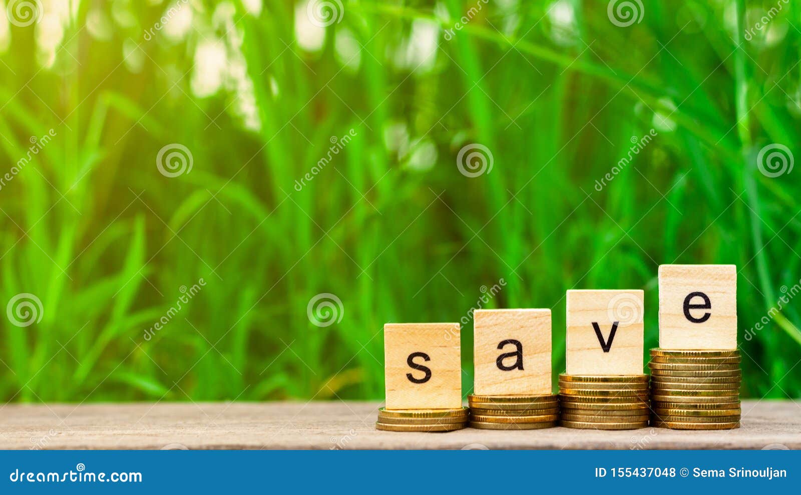 Save Word Stack of Coins and a Pile of Golden Coins on Wooden Table ...