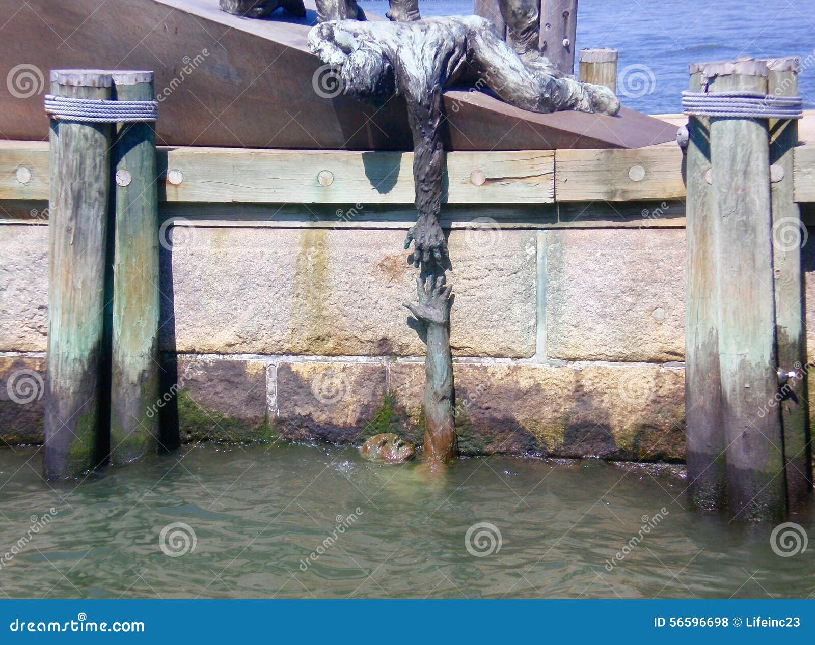 Saving The Drowning. Helping Hand Pulls To Sinking Man In Ocean Stock ...