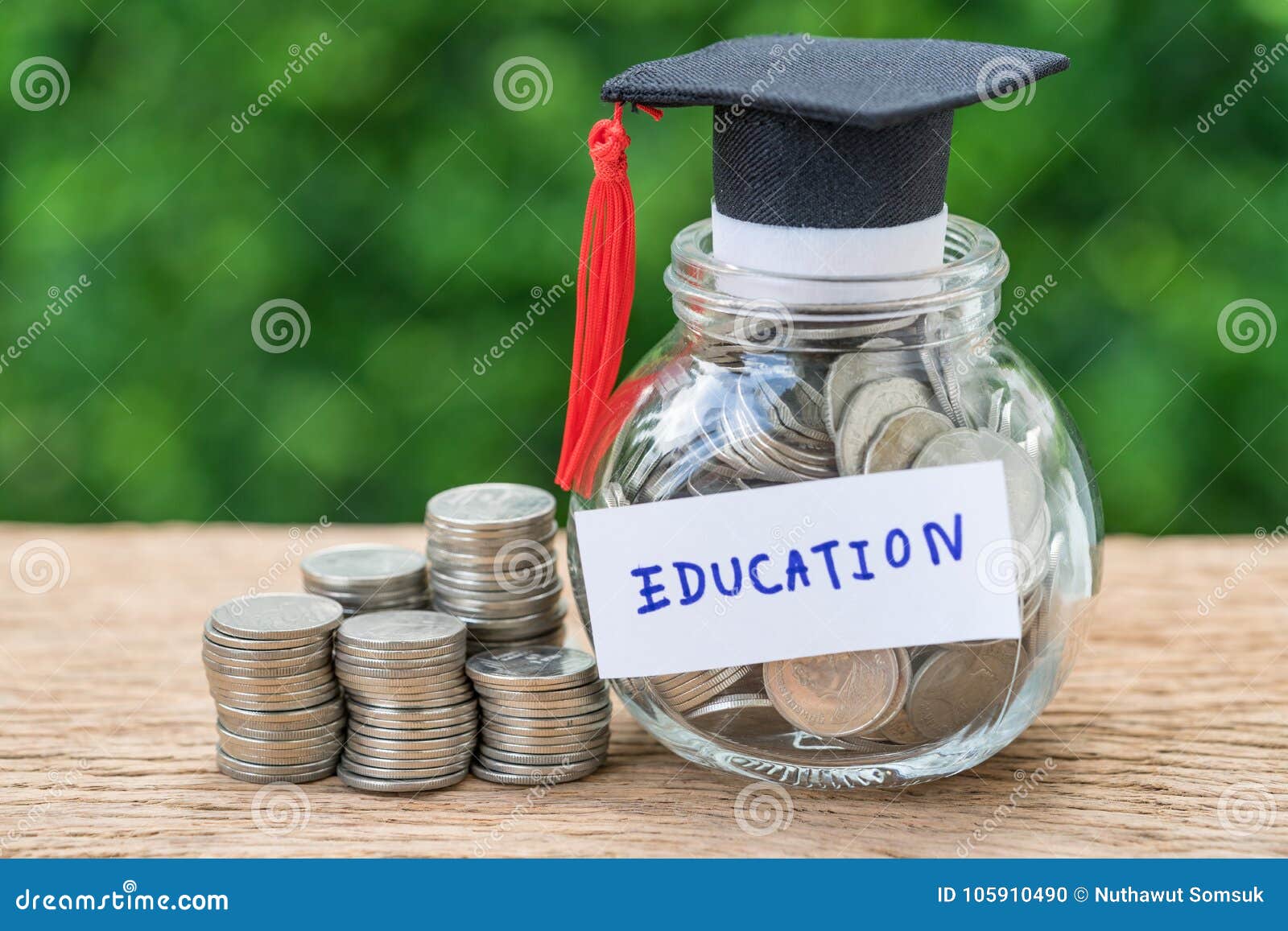 Saving for Education with Coins in Jar and Graduates Hat Label a Stock ...