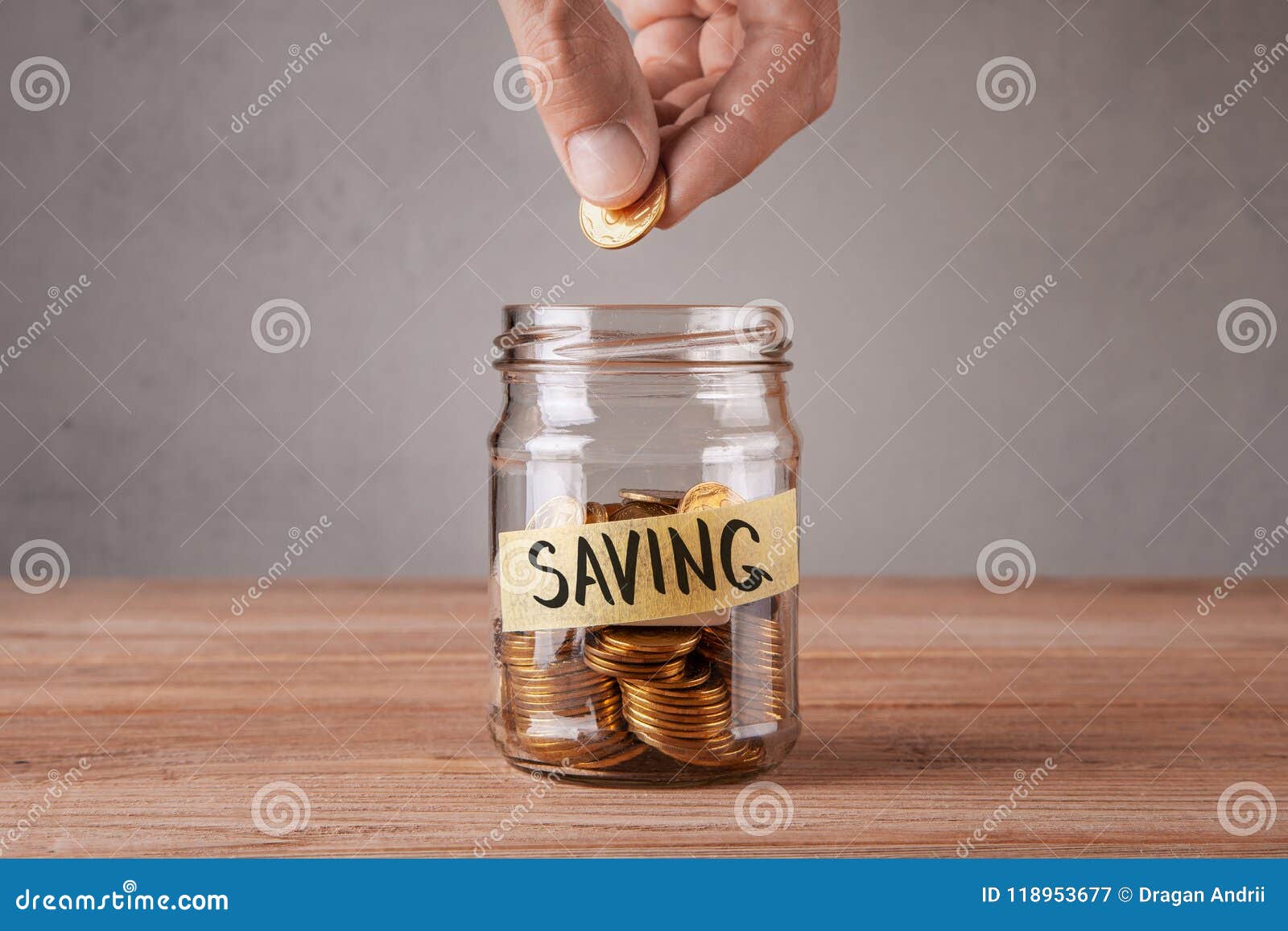 Saving. Glass Jar with Coins and an Inscription Saving Stock Image ... Saving. Glass Jar with Coins and an Inscription Saving Stock Image ...