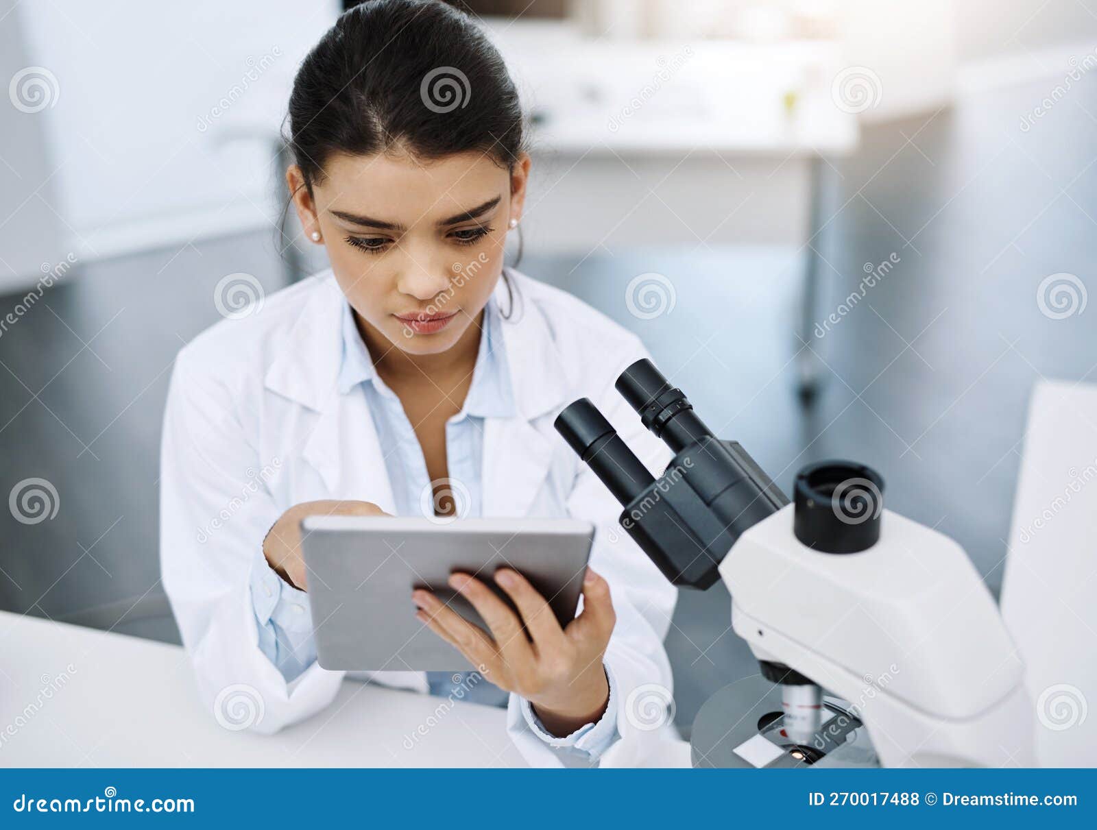 Saving Her Findings for Further Insights. a Young Scientist Using a ...