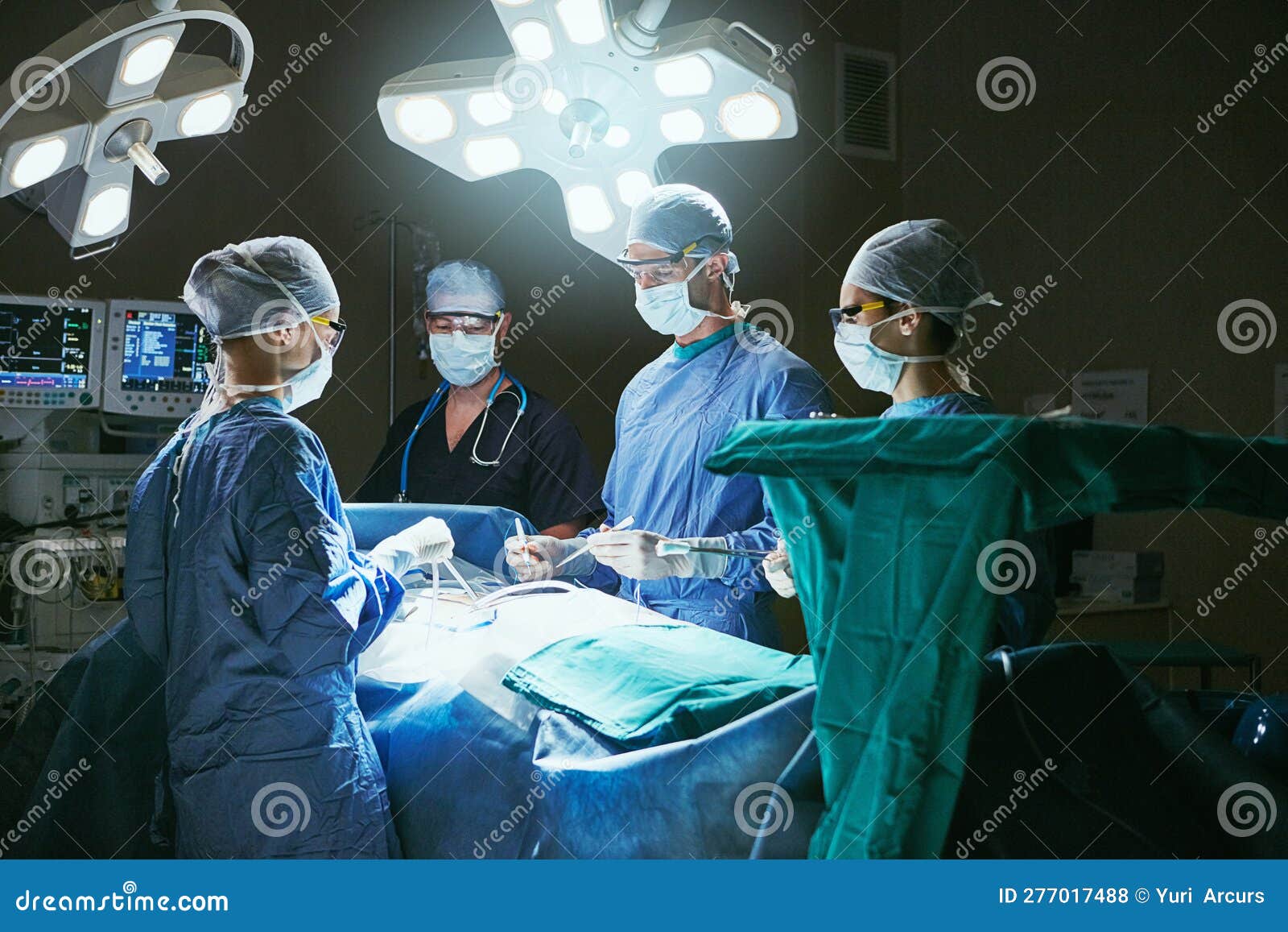 Saving Lives is a Full Time Job. Surgeons in an Operating Room. Stock ...