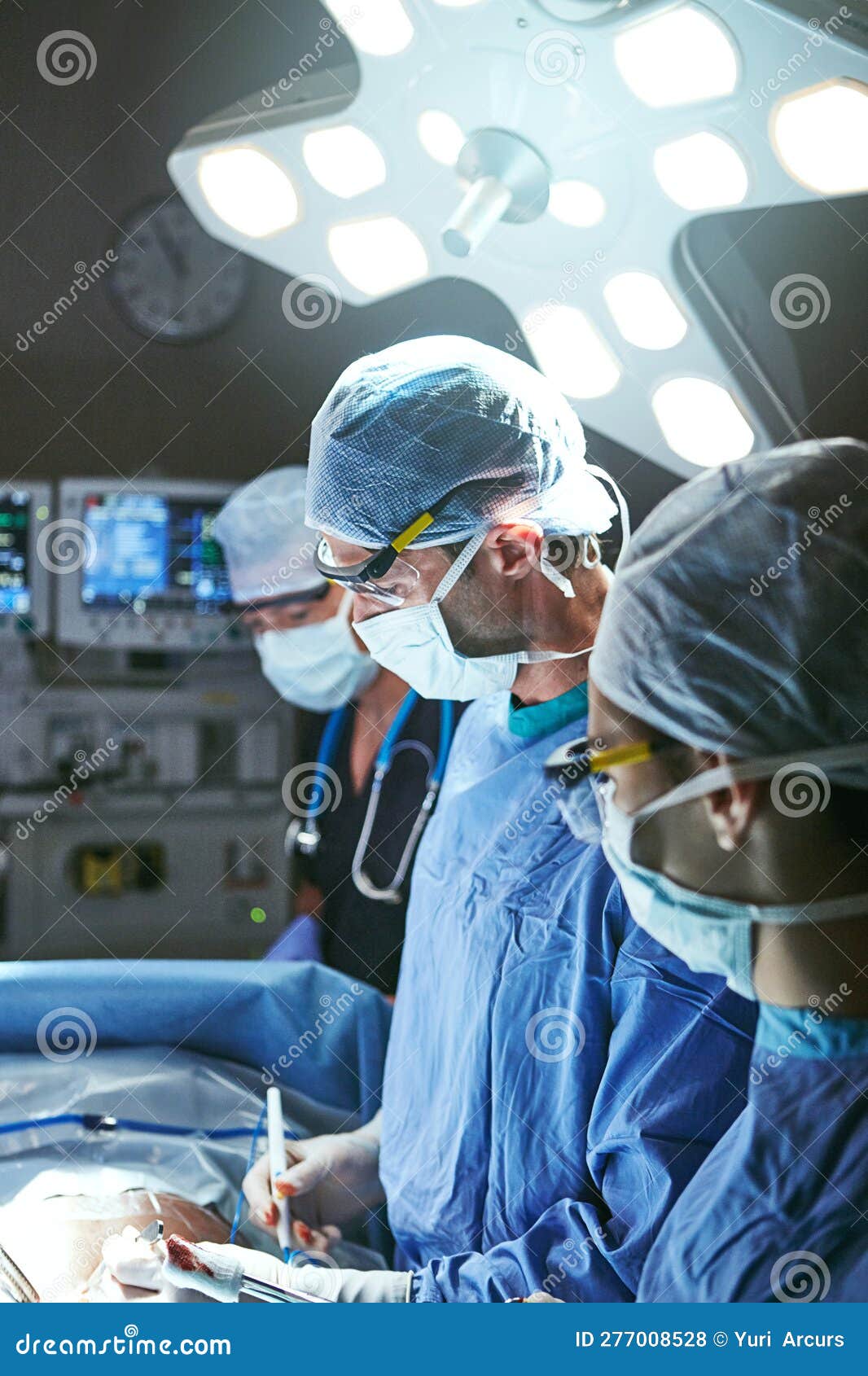 Saving Lives is Top Priority. Surgeons in an Operating Room. Stock ...
