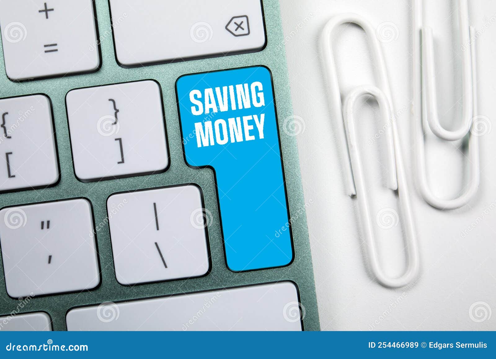 Saving Money. Computer Keyboard on a White Office Table Stock Image ...