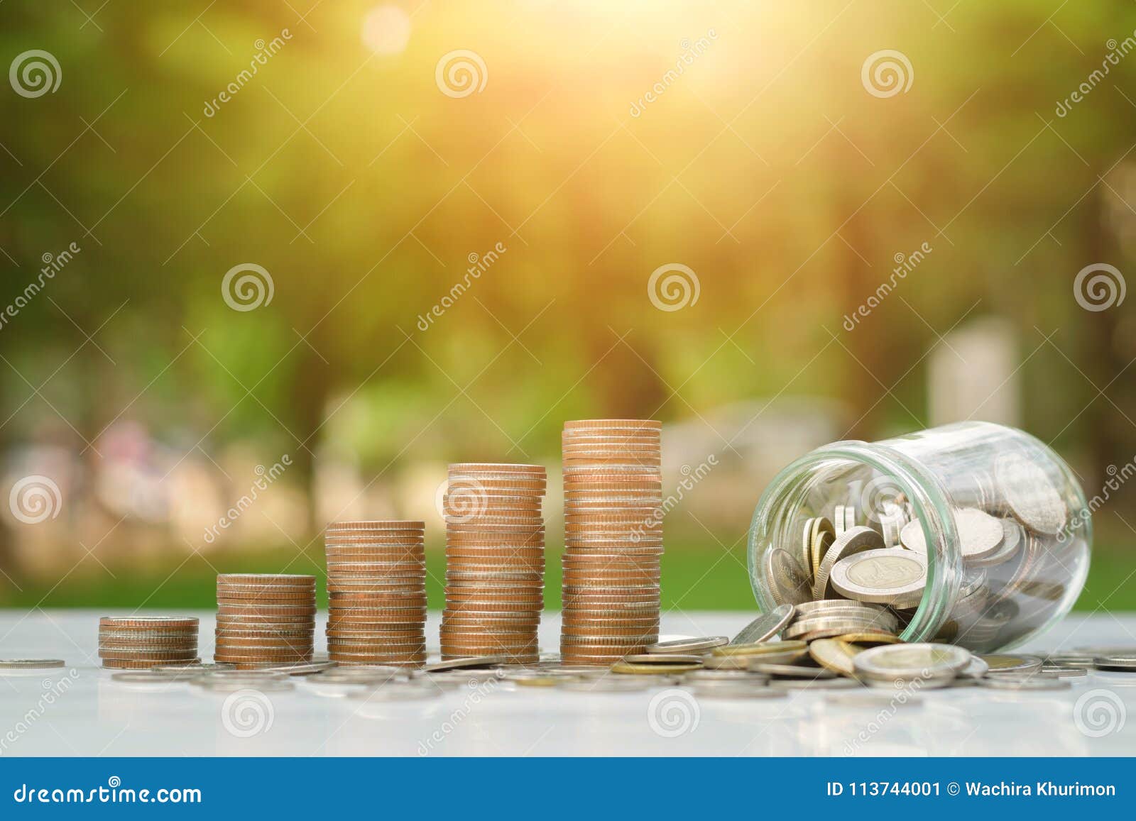Saving Money Concept With Coin Stack Growing And Bottle Business On ...