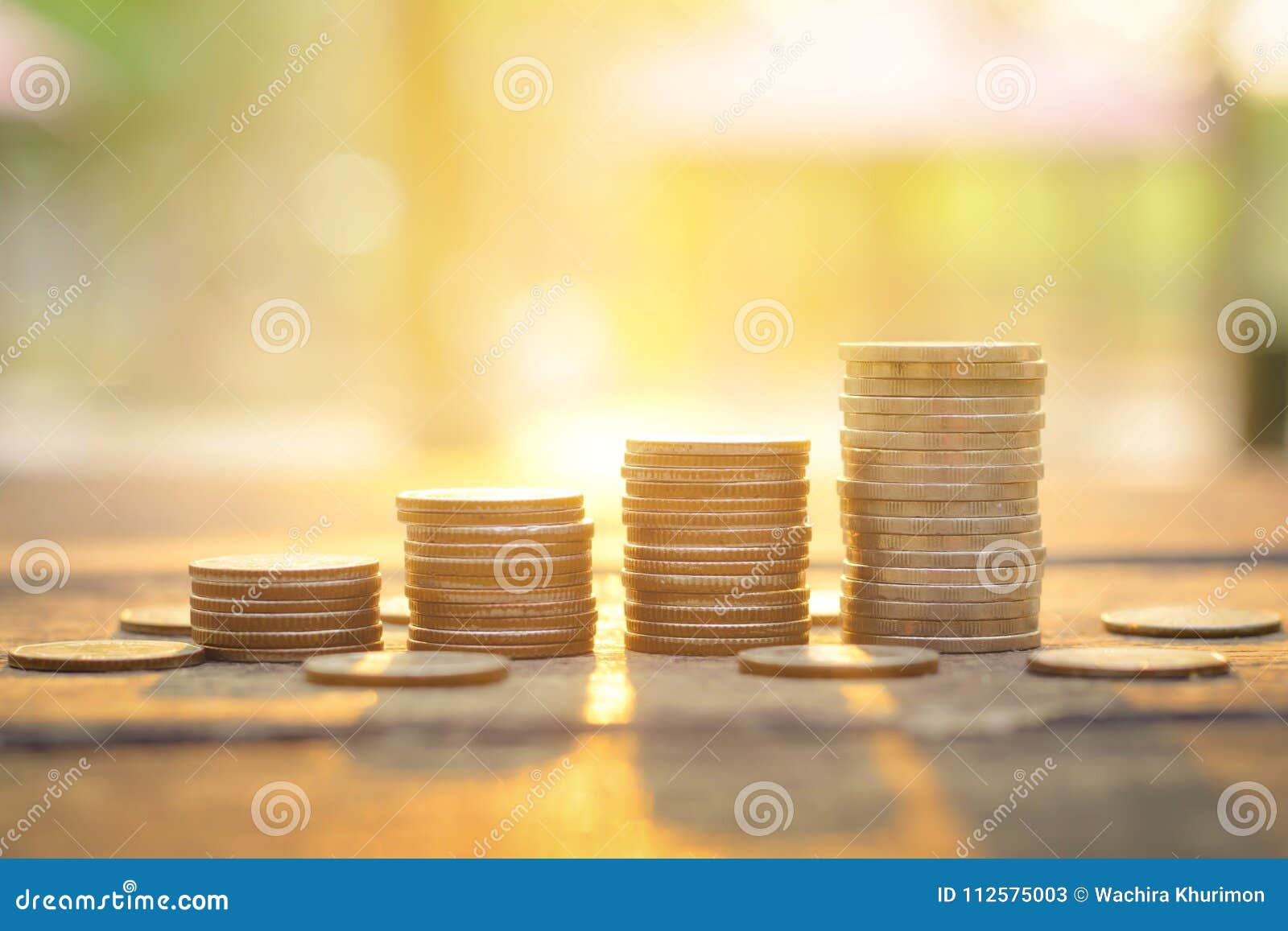 Saving Money Concept with Coin Stack Growing Business on Sunset ...