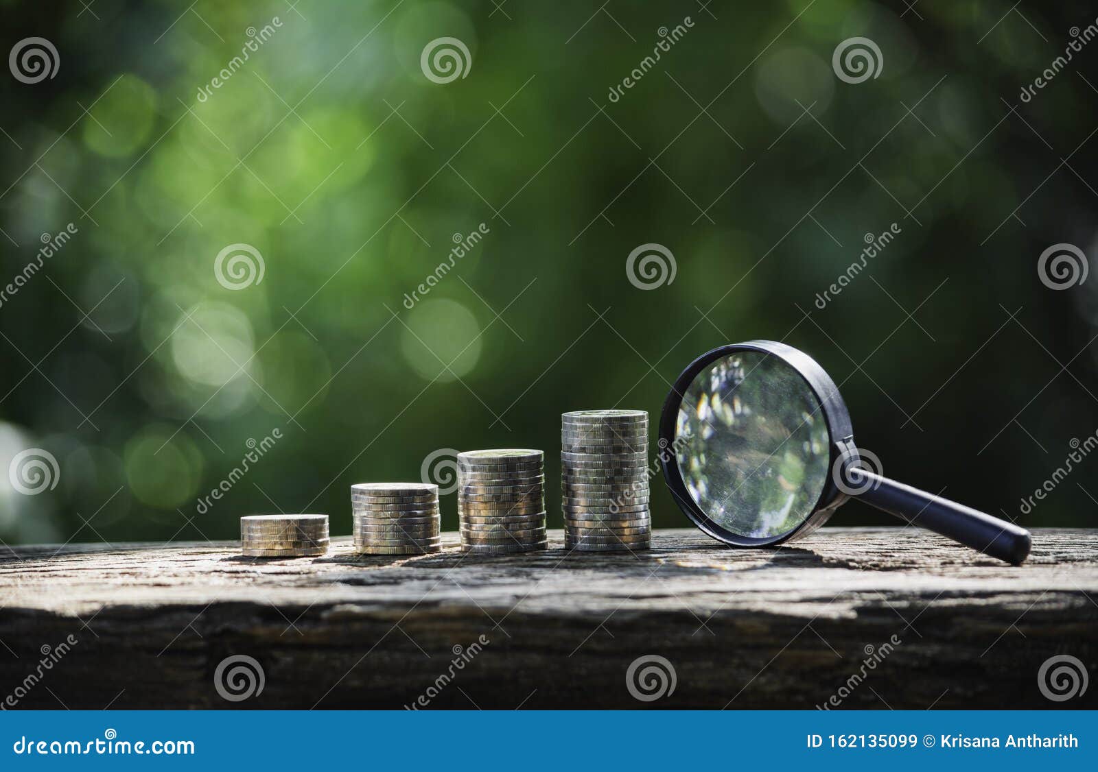Saving Money Concept with Money Coin Stack and Magnifying Glass ...