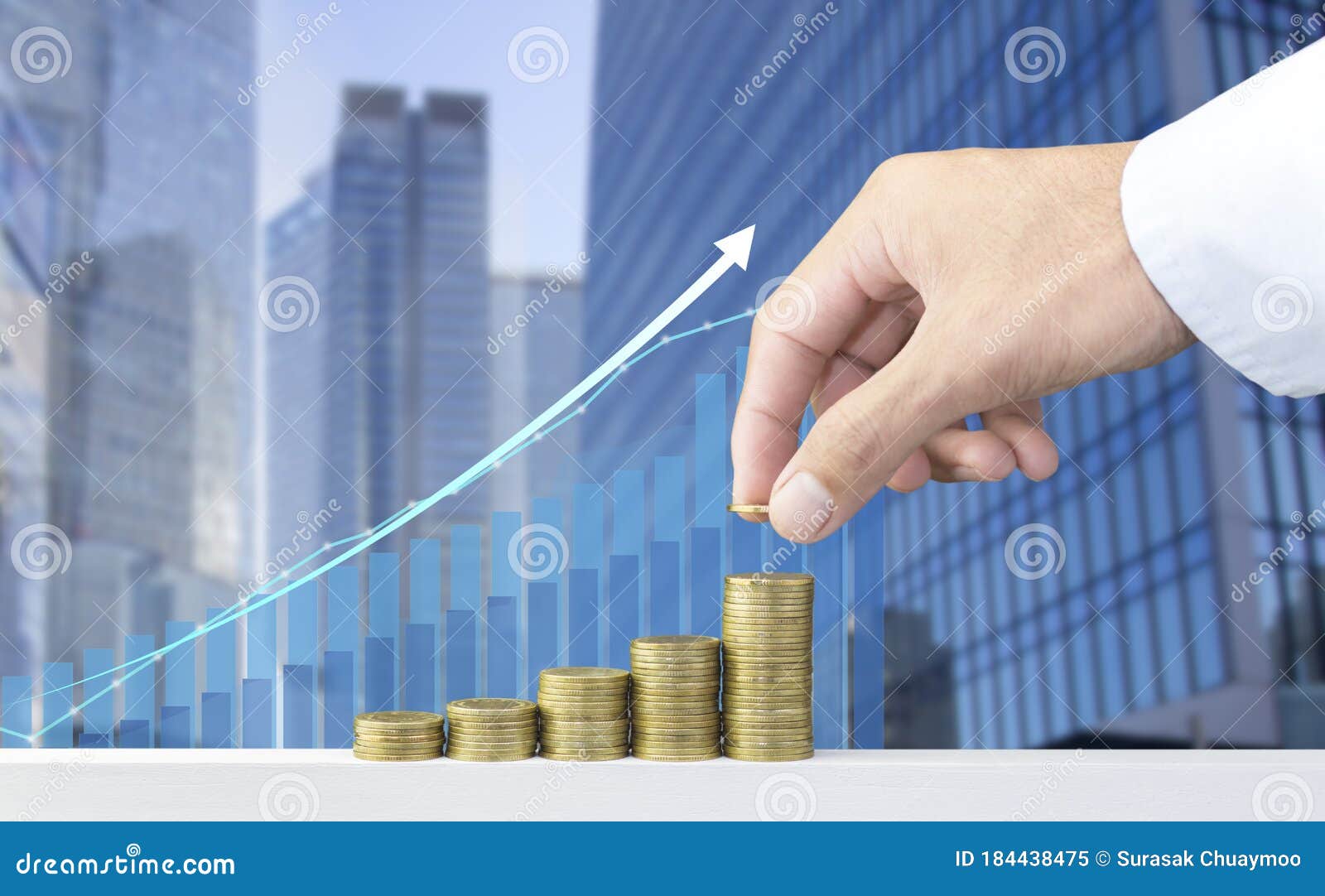 Saving Money and Investment Concept with Stack of Coins and Graph Blue ...