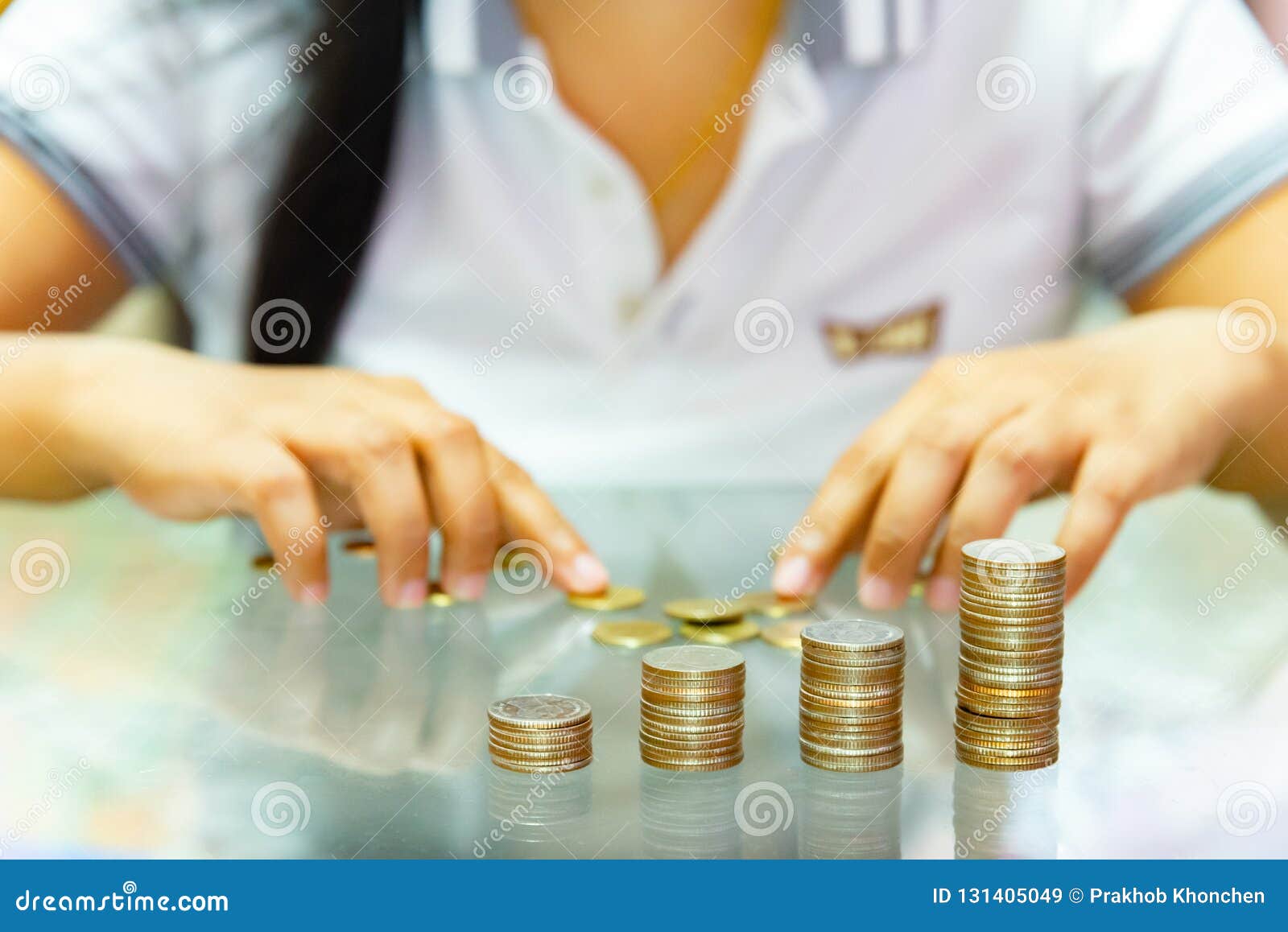 Saving Money, Woman Stacking Coins into Increasing Columns Stock Image ...