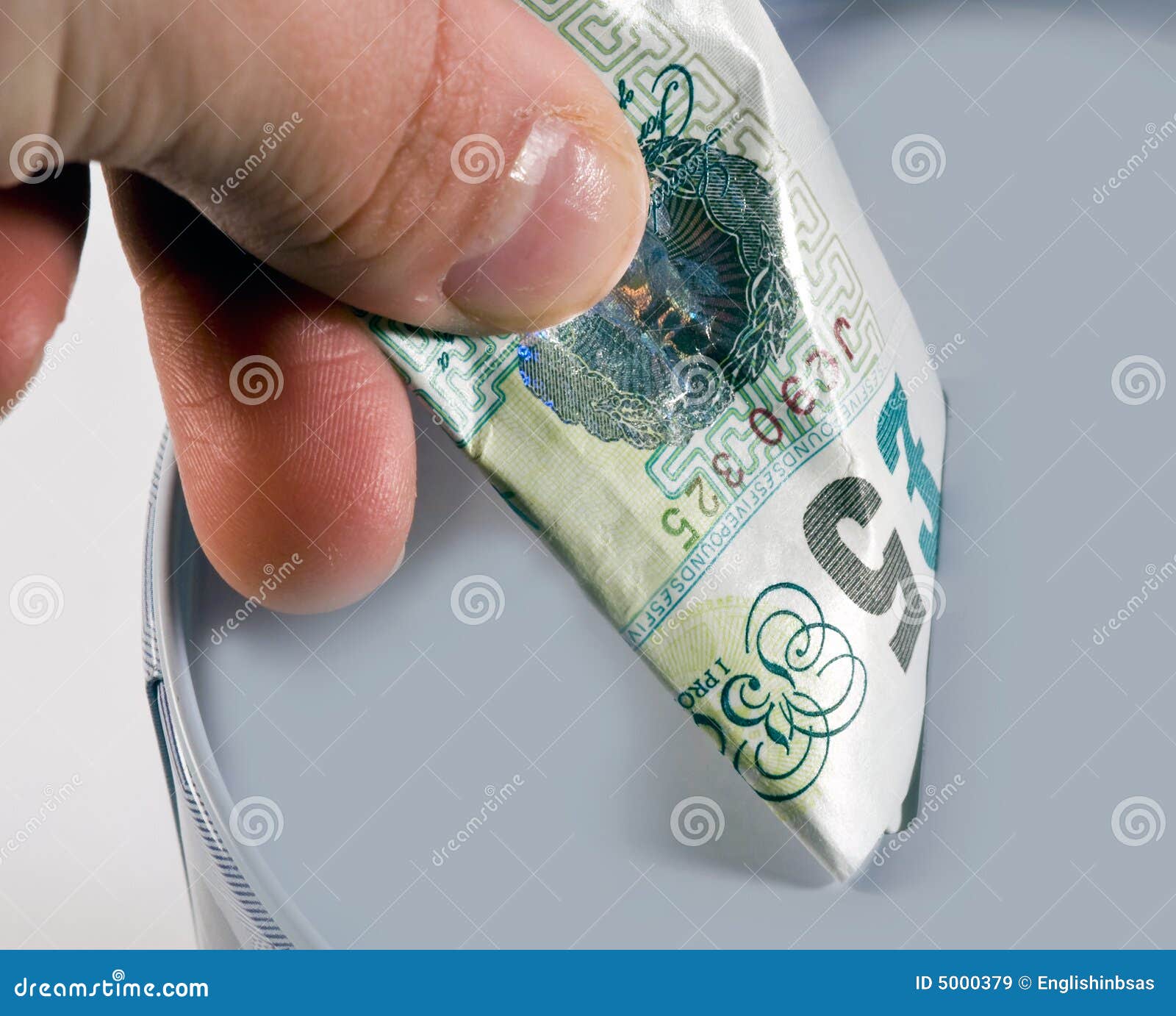 Saving one pound sterling editorial stock image. Image of coin - 5000379