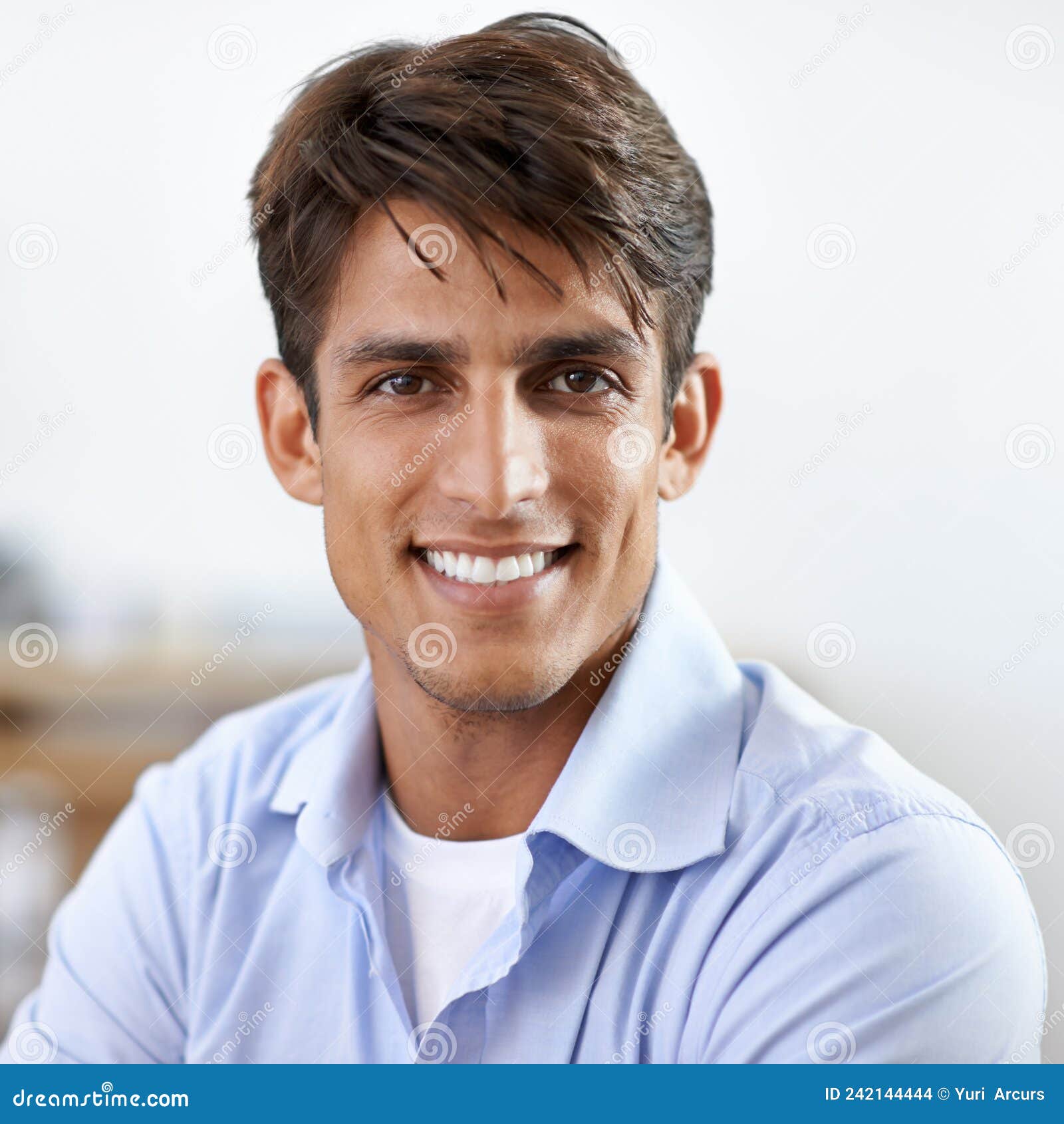 Savvy Businessman. a Handsome Young Smiling Businessman. Stock Photo ...