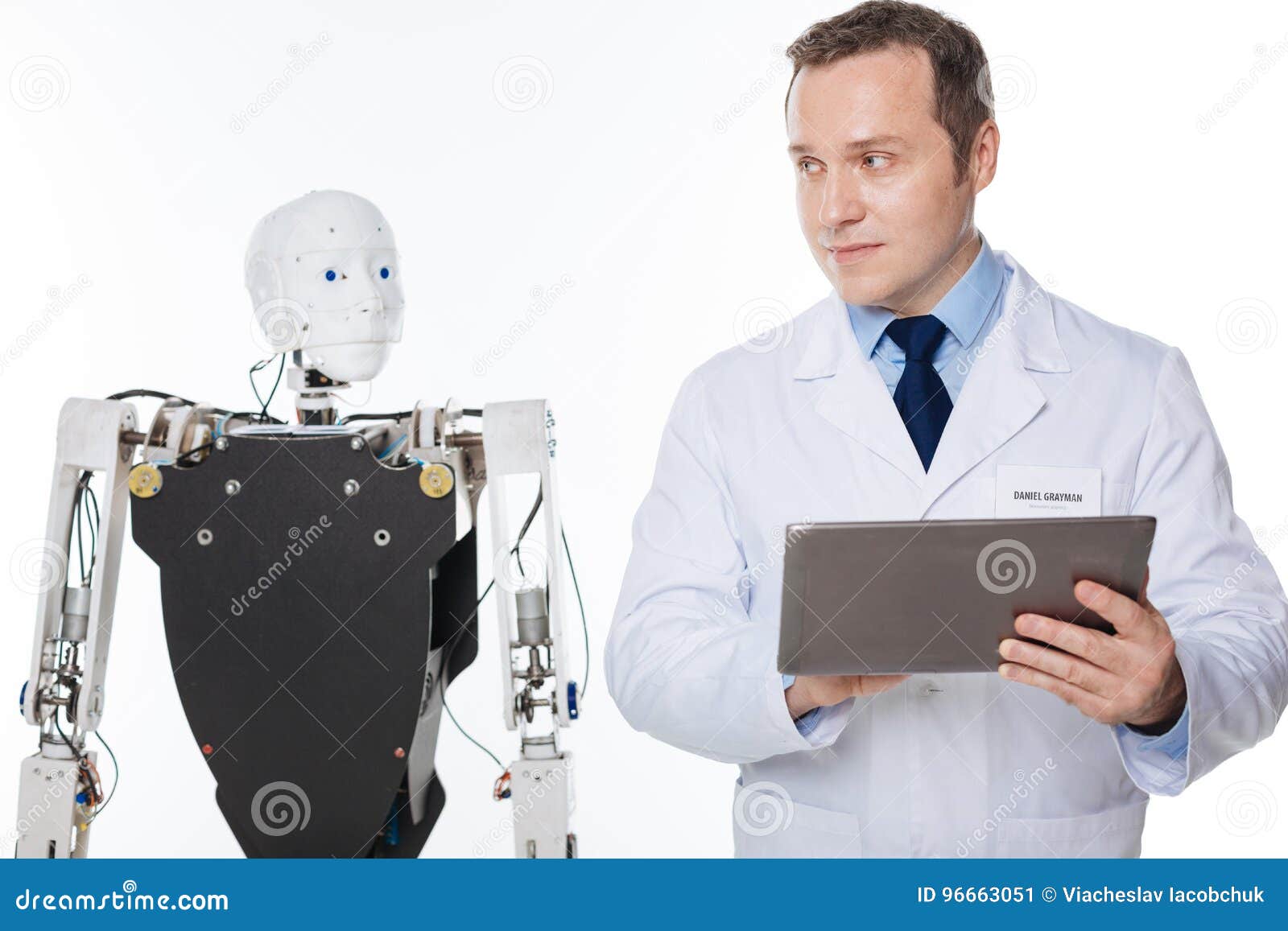 Savvy Curious Scientist Using His Gadget while Running an Experiment ...