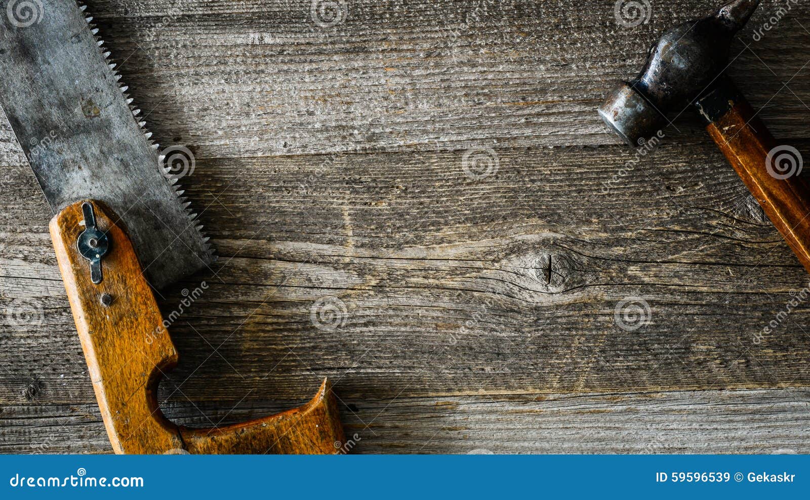 Saw and Hammer on Wooden Table Stock Image - Image of metallic, build ...