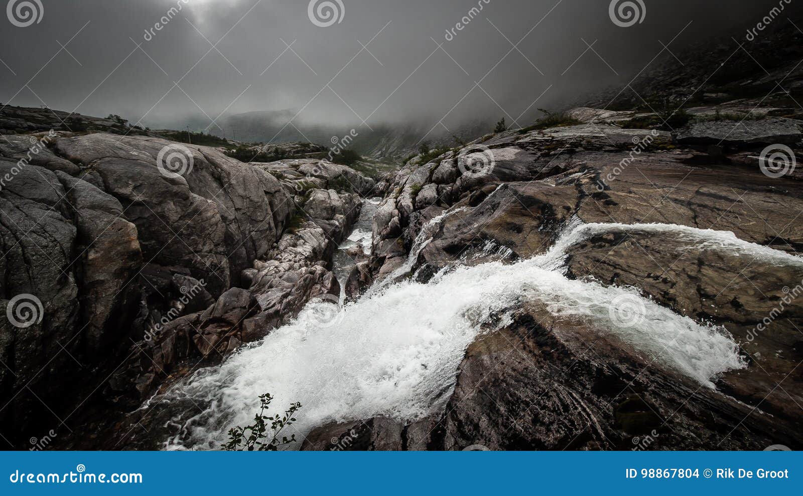 Dark Clouds and a Rough Waterfall Stock Photo - Image of white, travel ...