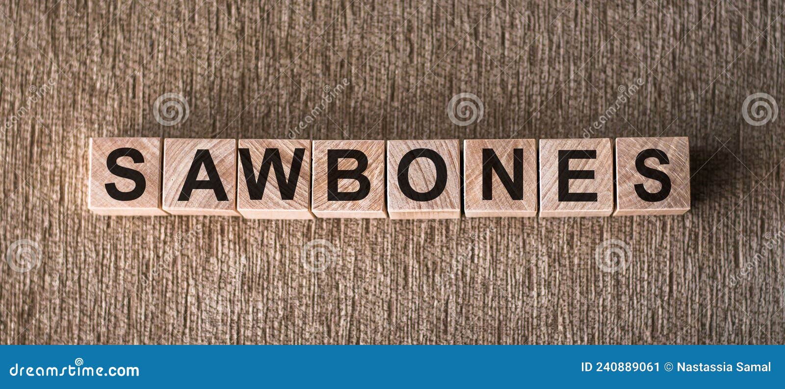 SAWBONES Word Written on Wooden Blocks on a Brown Background Stock ...