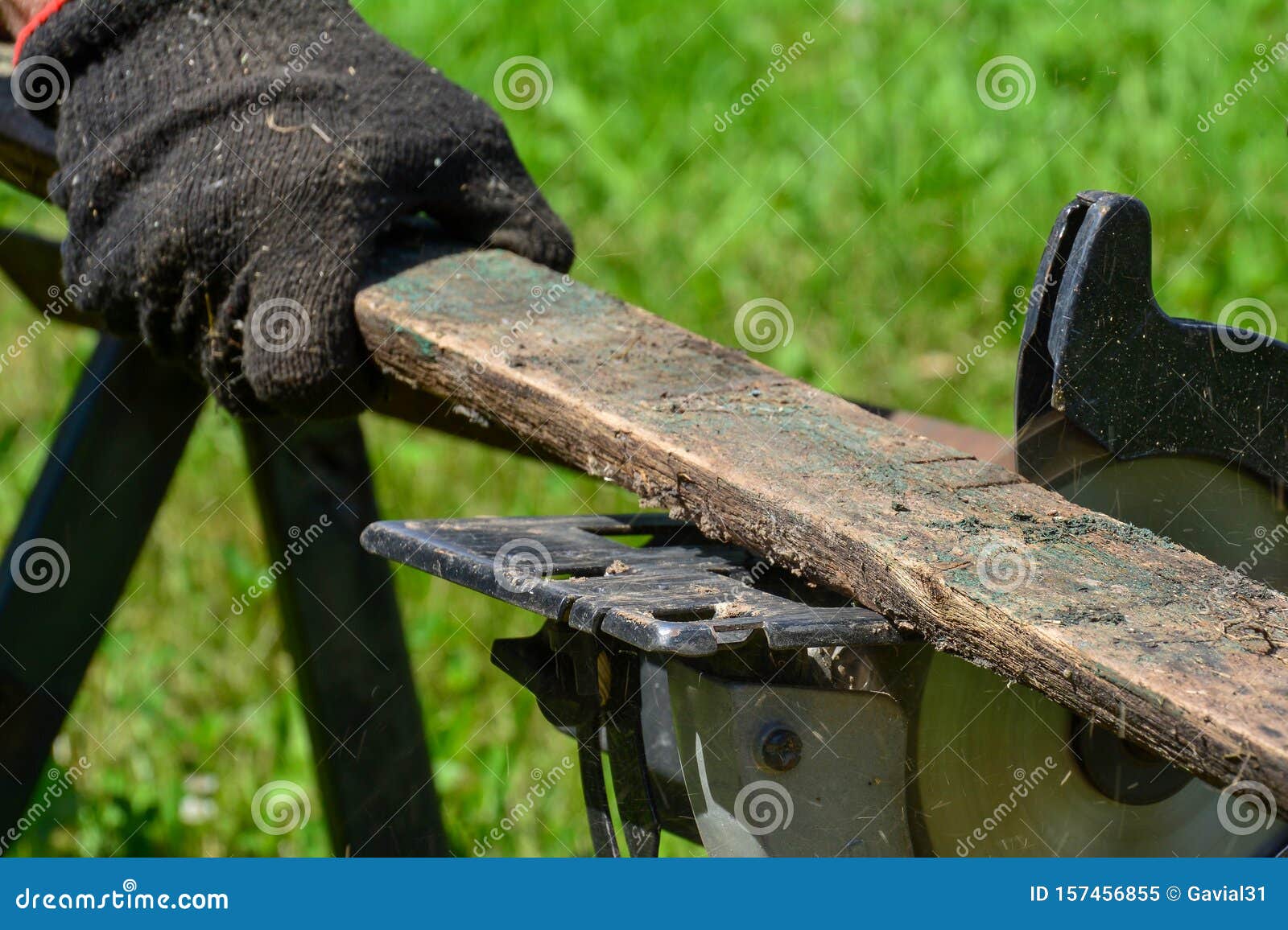 Sawing Old Boards with a Circular Saw. the Process of Sawing Wood for ...