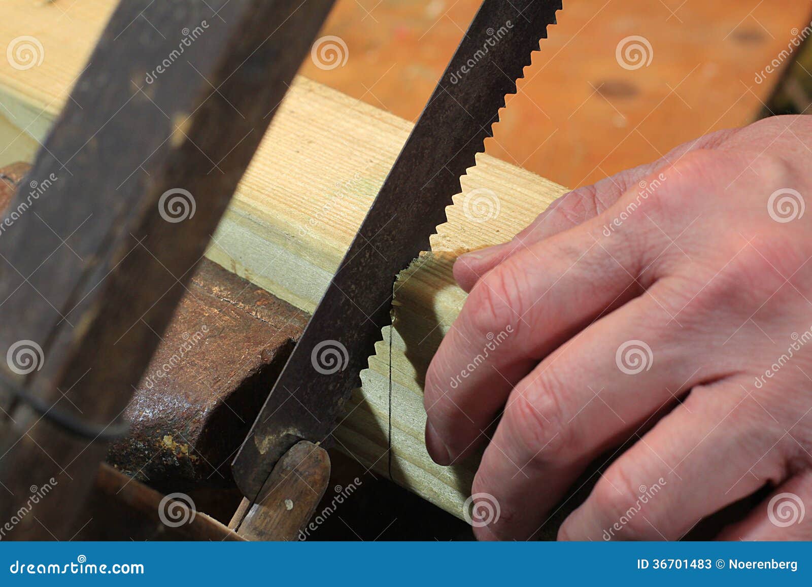 Sawing a wooden strip stock image. Image of modeling - 36701483