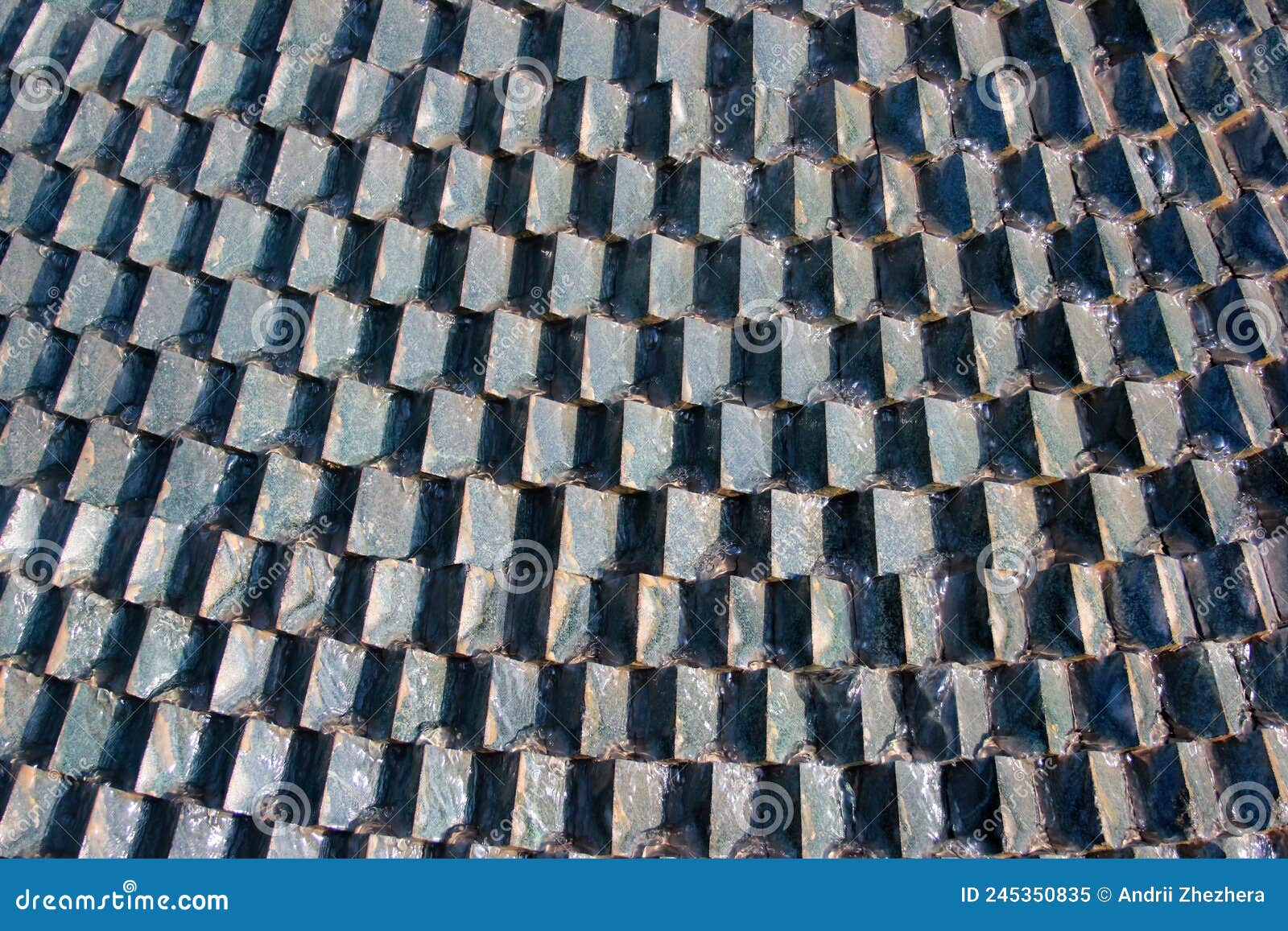 Sawtooth Pattern Brickwork. Decorative Grey Stone Cubes in a Wall As ...