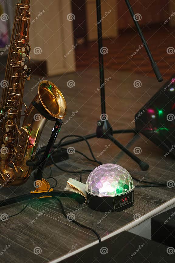 Saxophone Staying on the Rack at the Scene. Stock Image - Image of ...