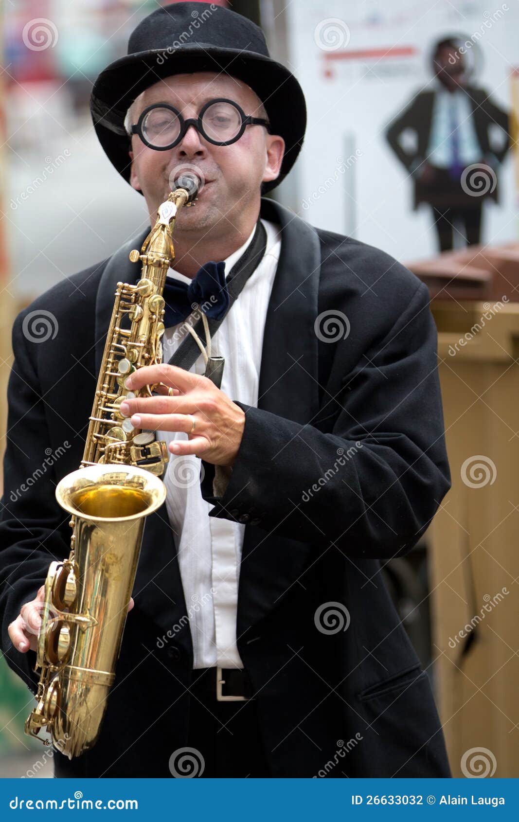 Saxophonist in the street editorial photography. Image of band - 26633032