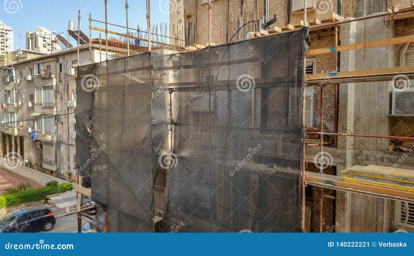 Scaffold and Scaffolding Net Erected at the Construction Site Editorial ...