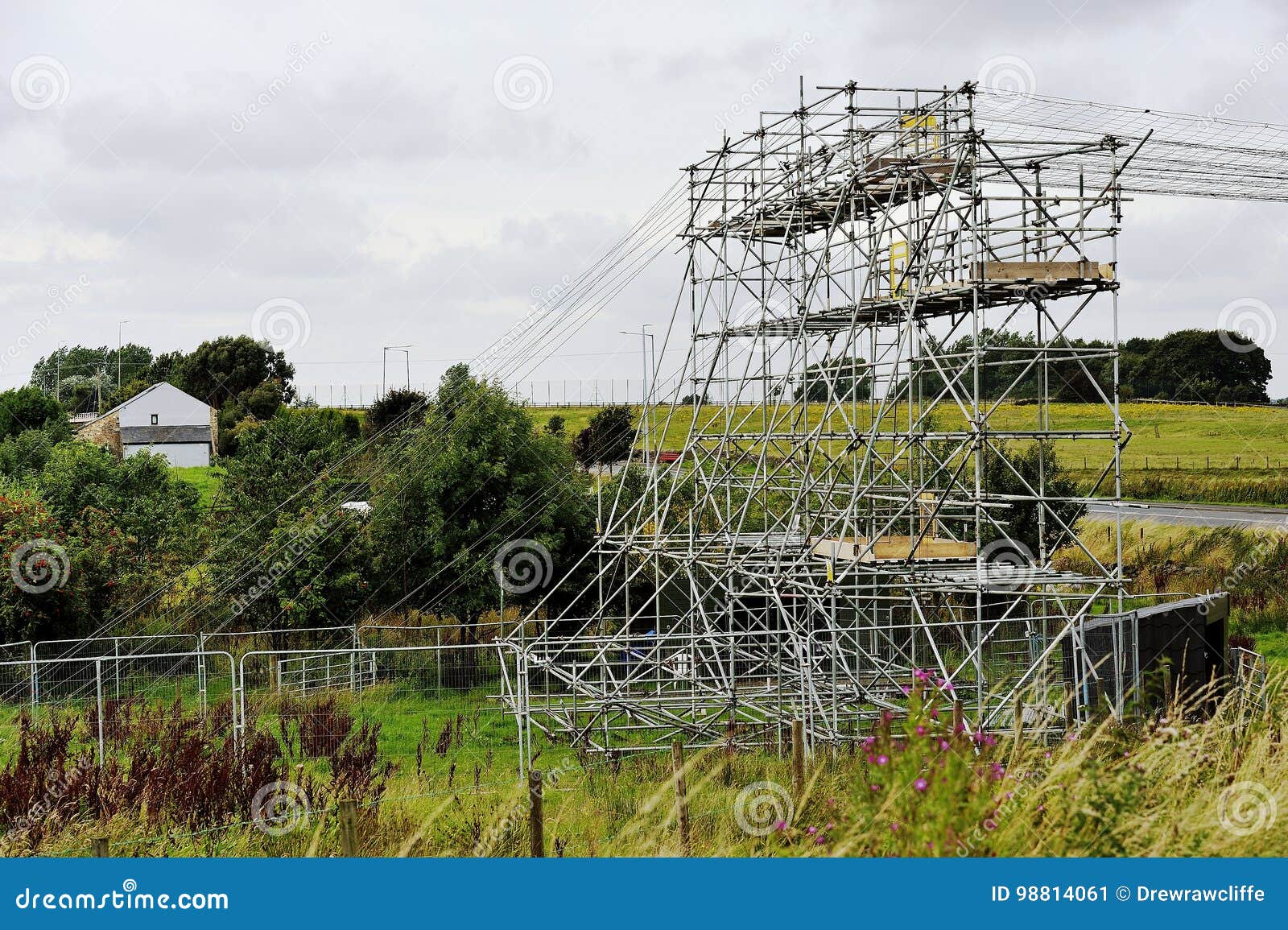 Scaffold tower in a field stock image. Image of street - 98814061