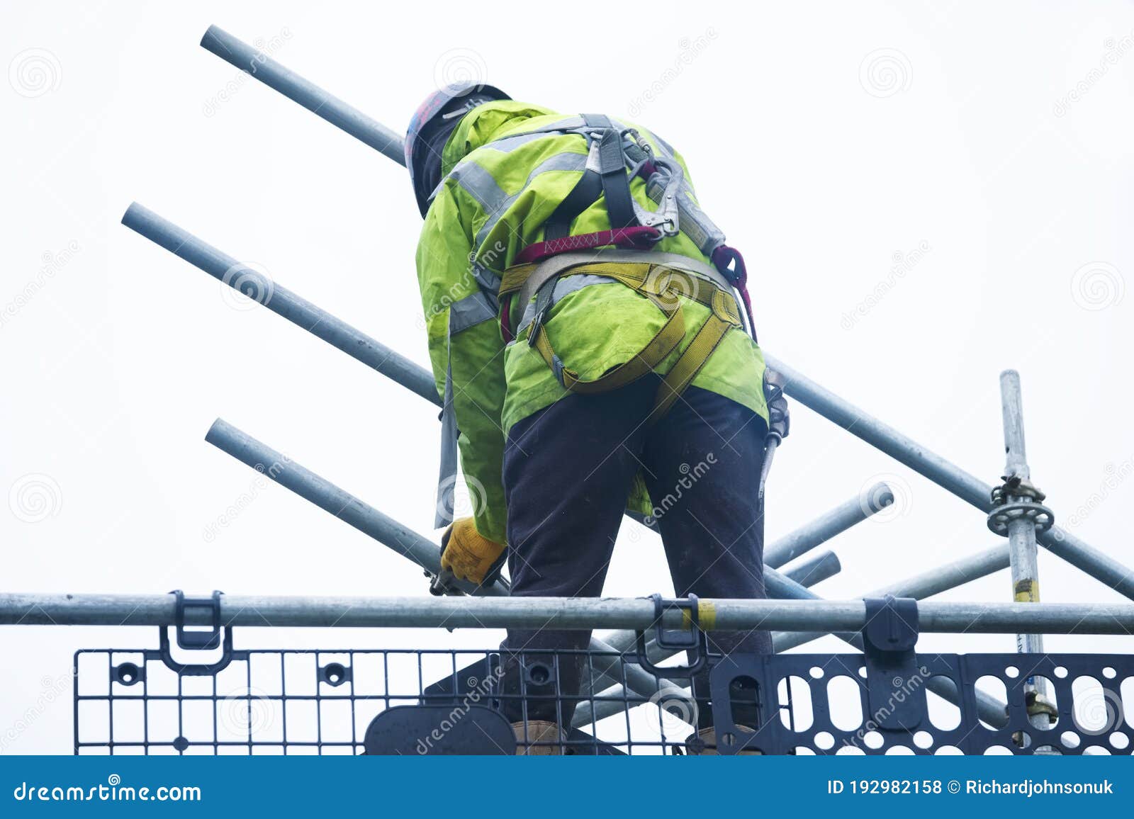 Scaffold Worker Dismantling Access Structure on Construction Building ...