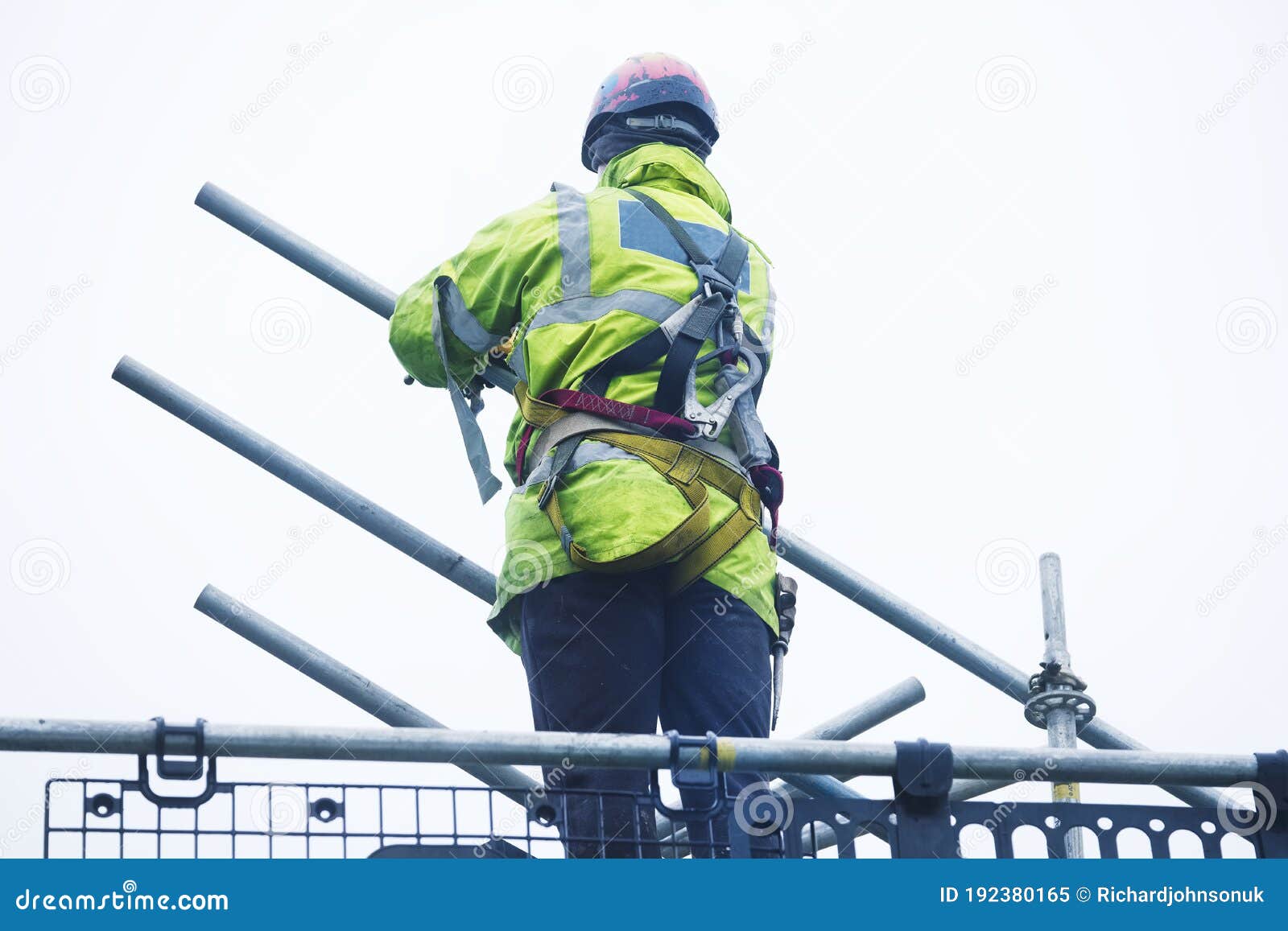 Scaffold Worker Dismantling Access Structure on Construction Building ...