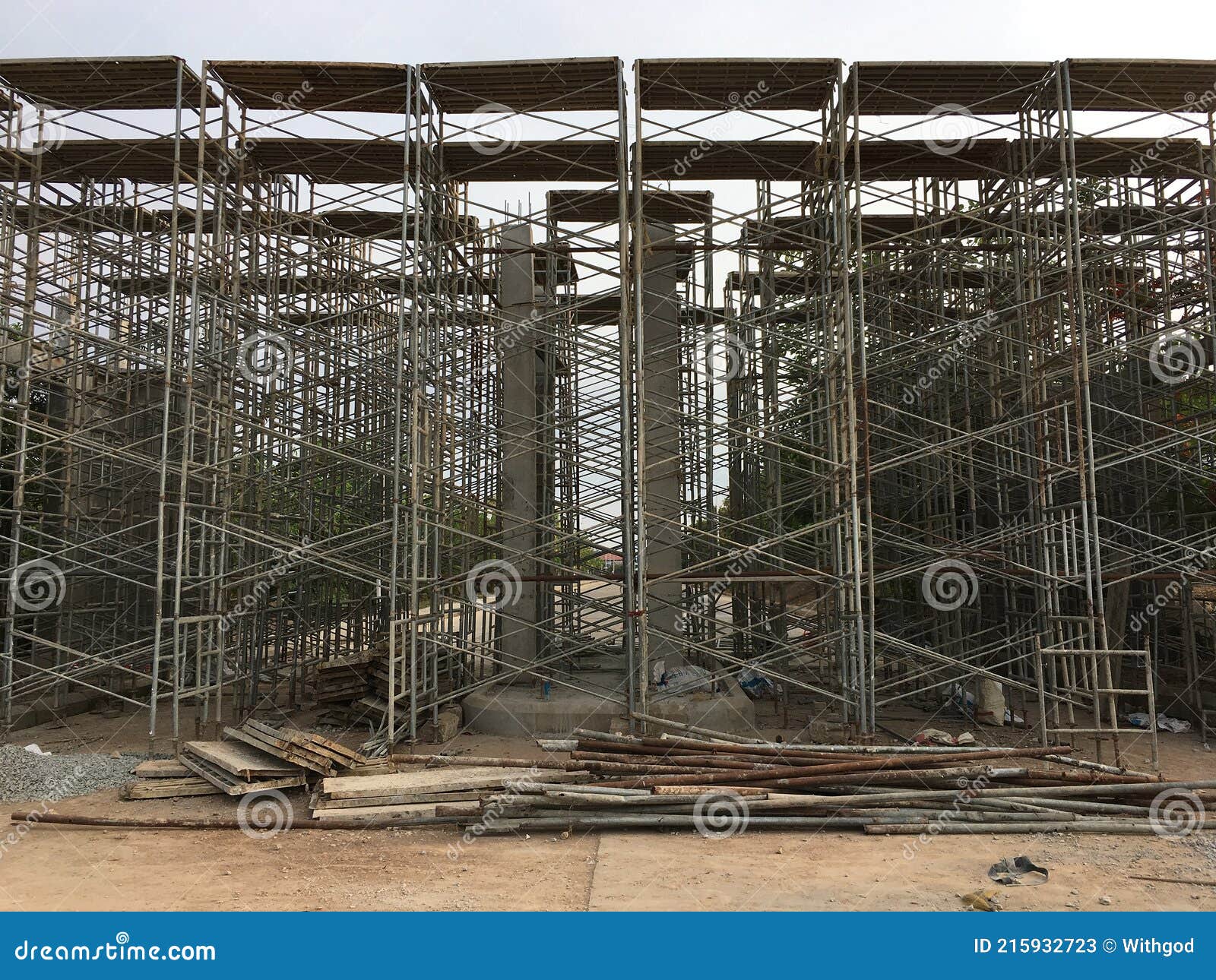 Scaffolding With Arch For People. Silhouettes Of People On The ...