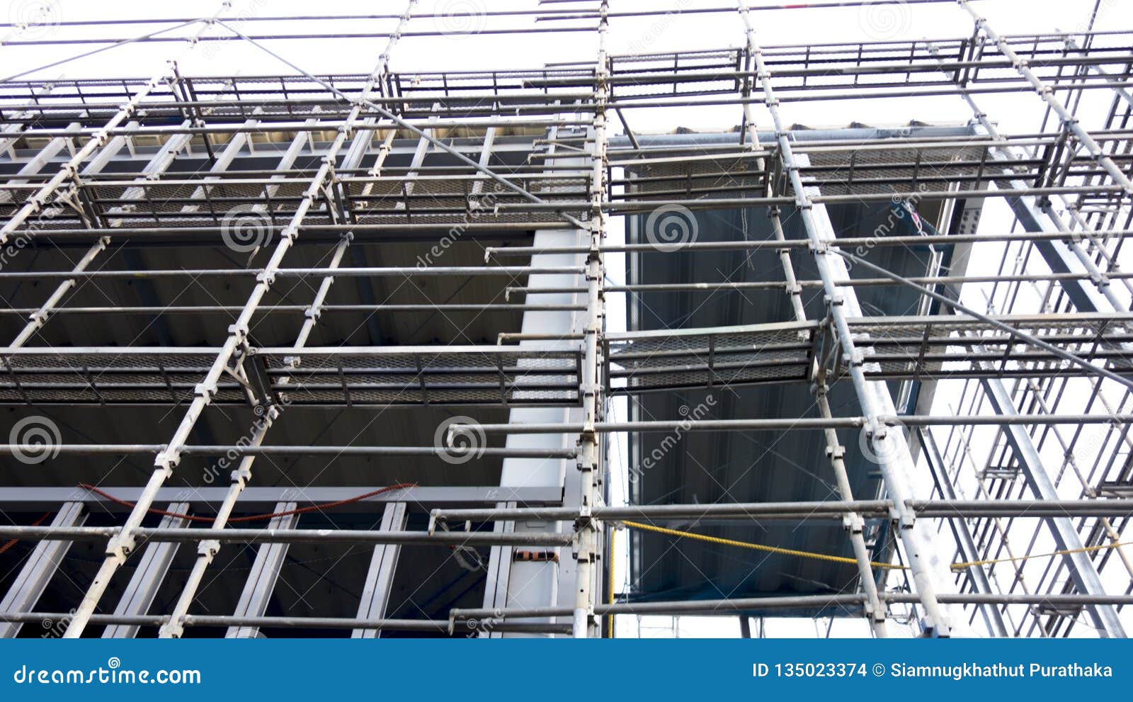Scaffolding Around the Building for the New Construction Stock Photo ...