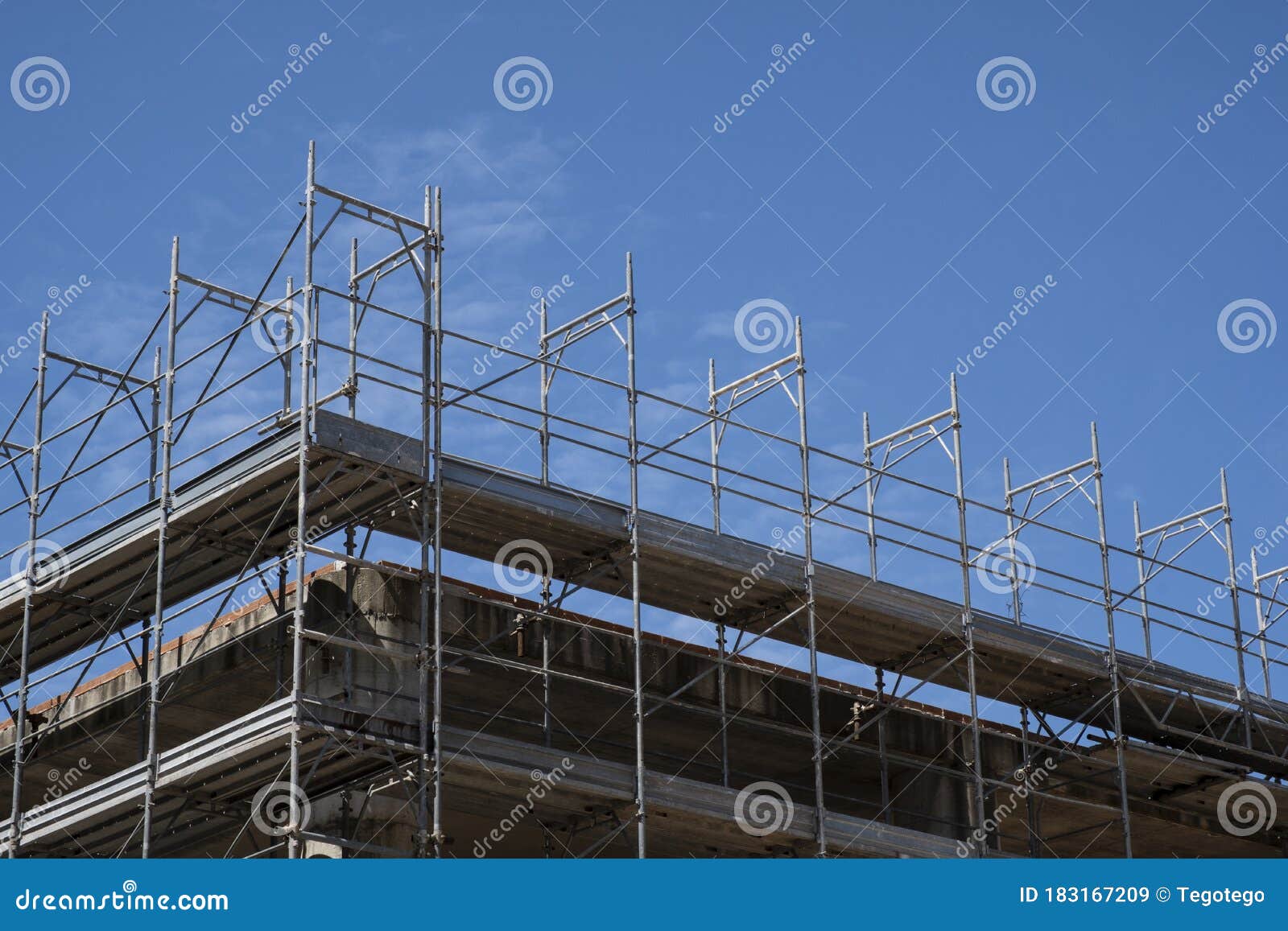 Scaffolding On Building. Building Covered In Scaffolding At Cons Stock ...