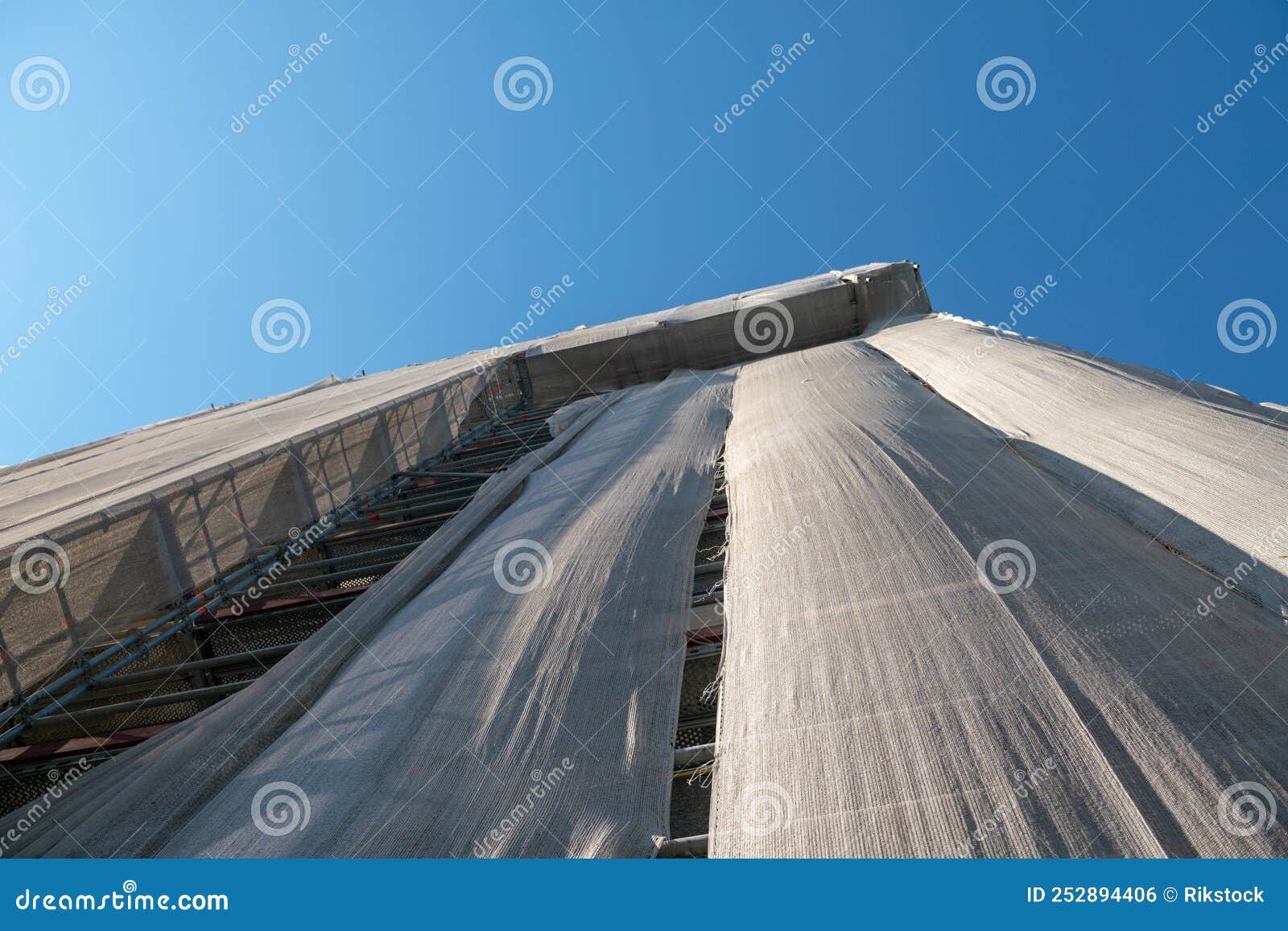Scaffolding: a Building Covered with a White Sheet Against the Fall of ...