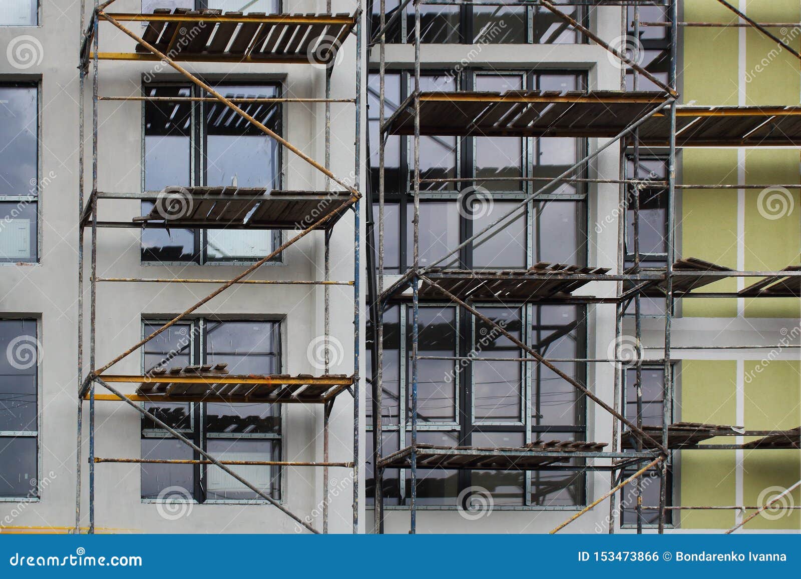 Scaffolding on Building Facadewith Windows. Scaffolding System in ...
