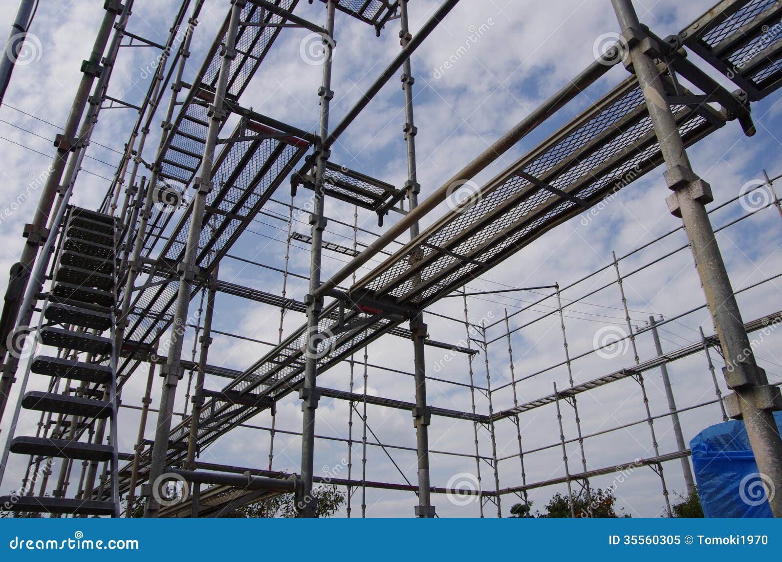 Scaffolding On Building. Building Covered In Scaffolding At Cons Stock ...