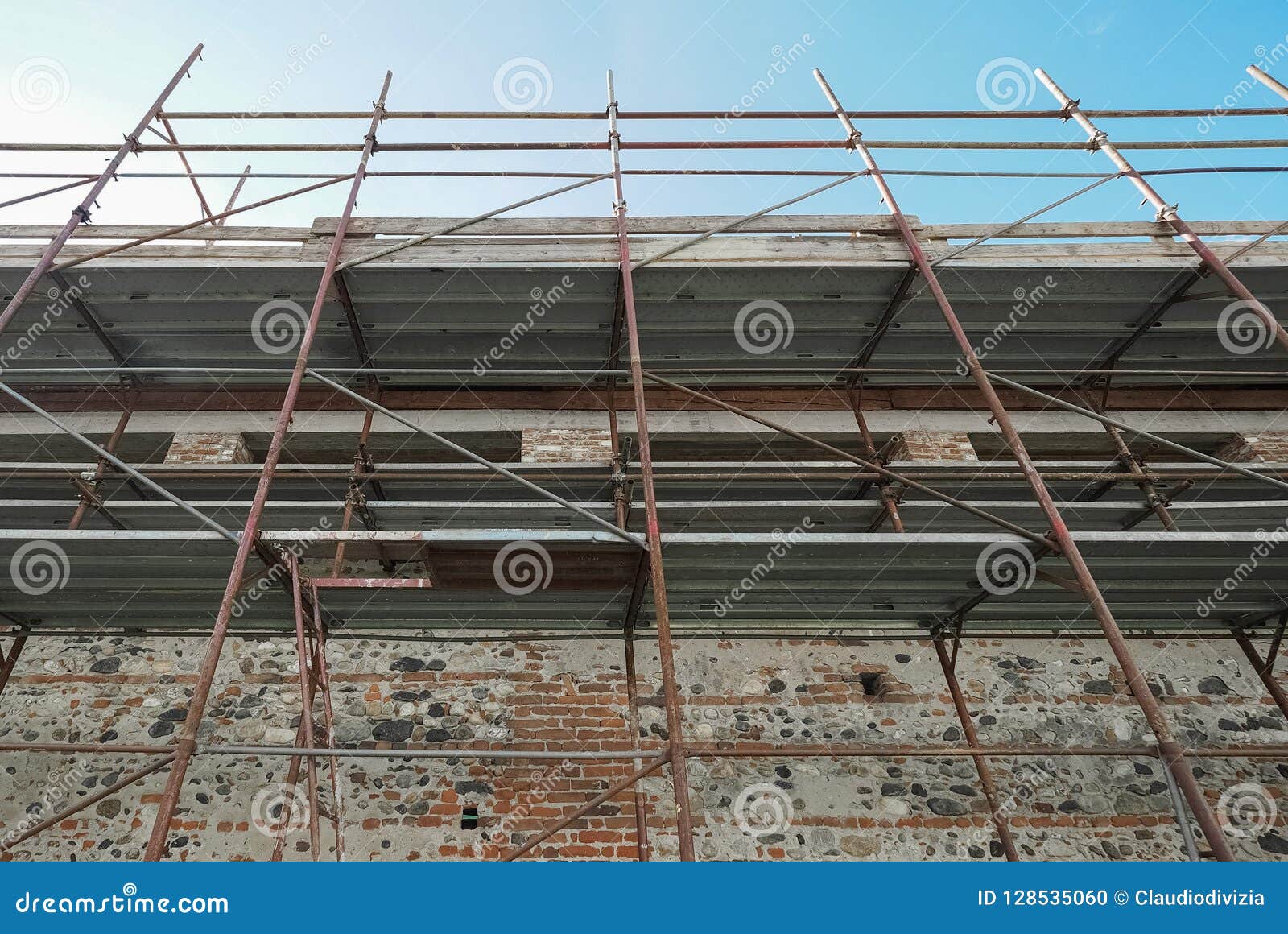 Scaffolding for building stock photo. Image of works - 128535060