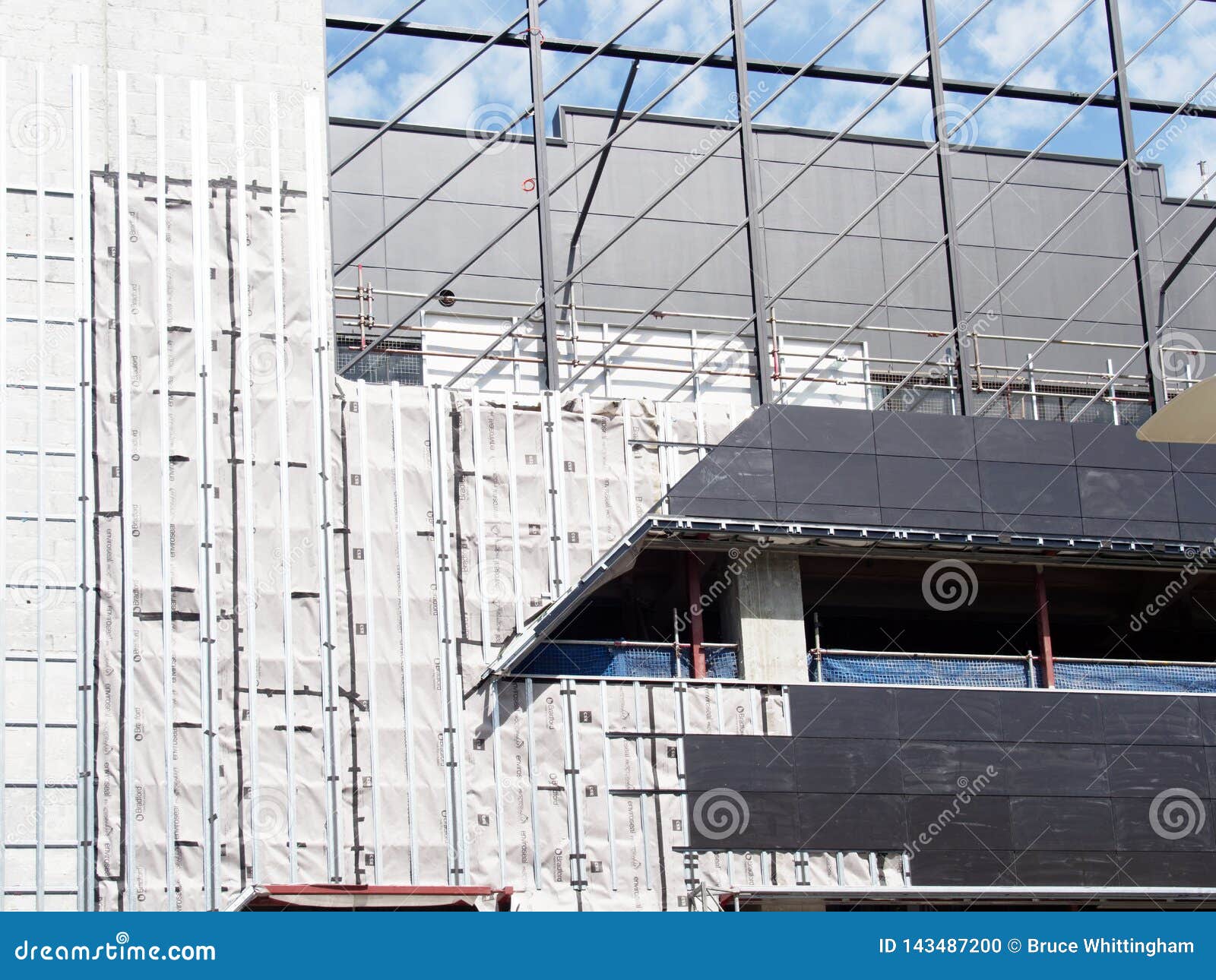 Scaffolding and Cladding on Mid-Rise Construction Site Stock Photo ...