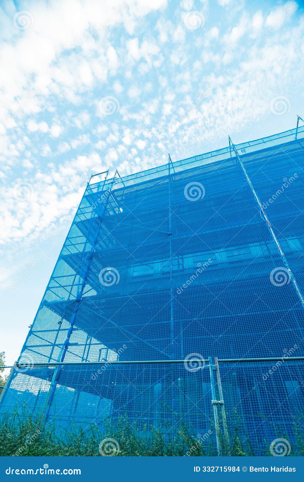 Scaffolding Construction Frame with Blue Safety Net Stock Photo - Image ...