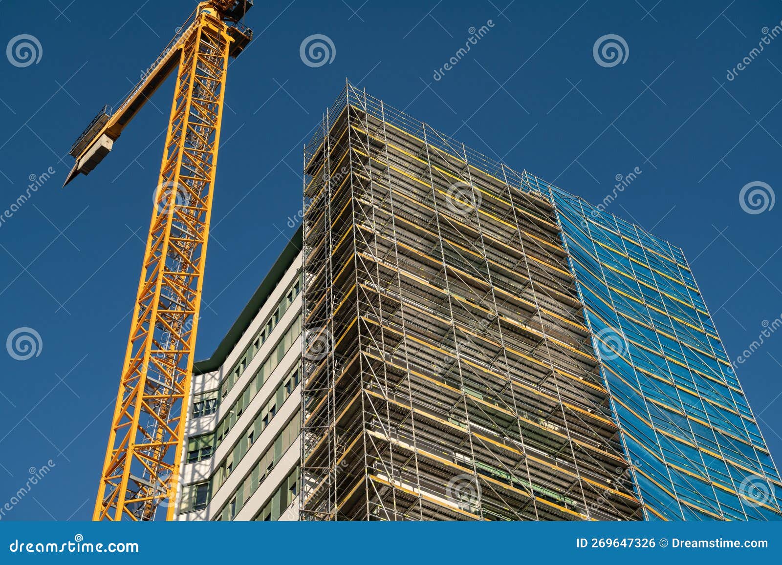 The Scaffolding In A Construction Site With Crane, The Realization ...