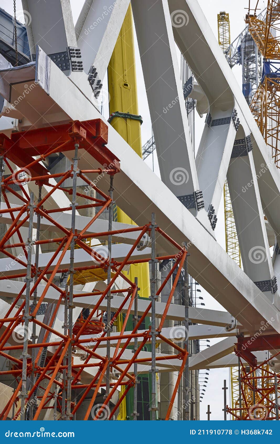 Scaffolding and Cranes Working Area. Construction Industry Stock Photo ...