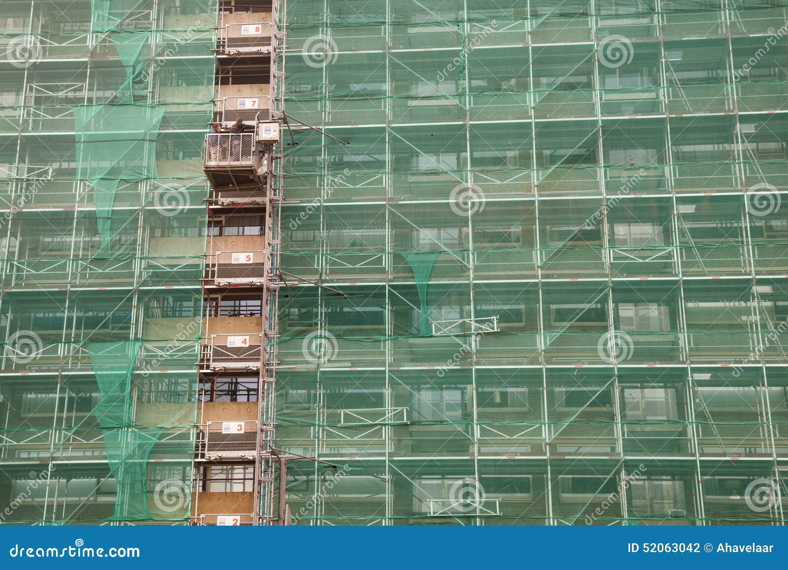 Scaffolding and Green Drapes for Protection Editorial Photography ...